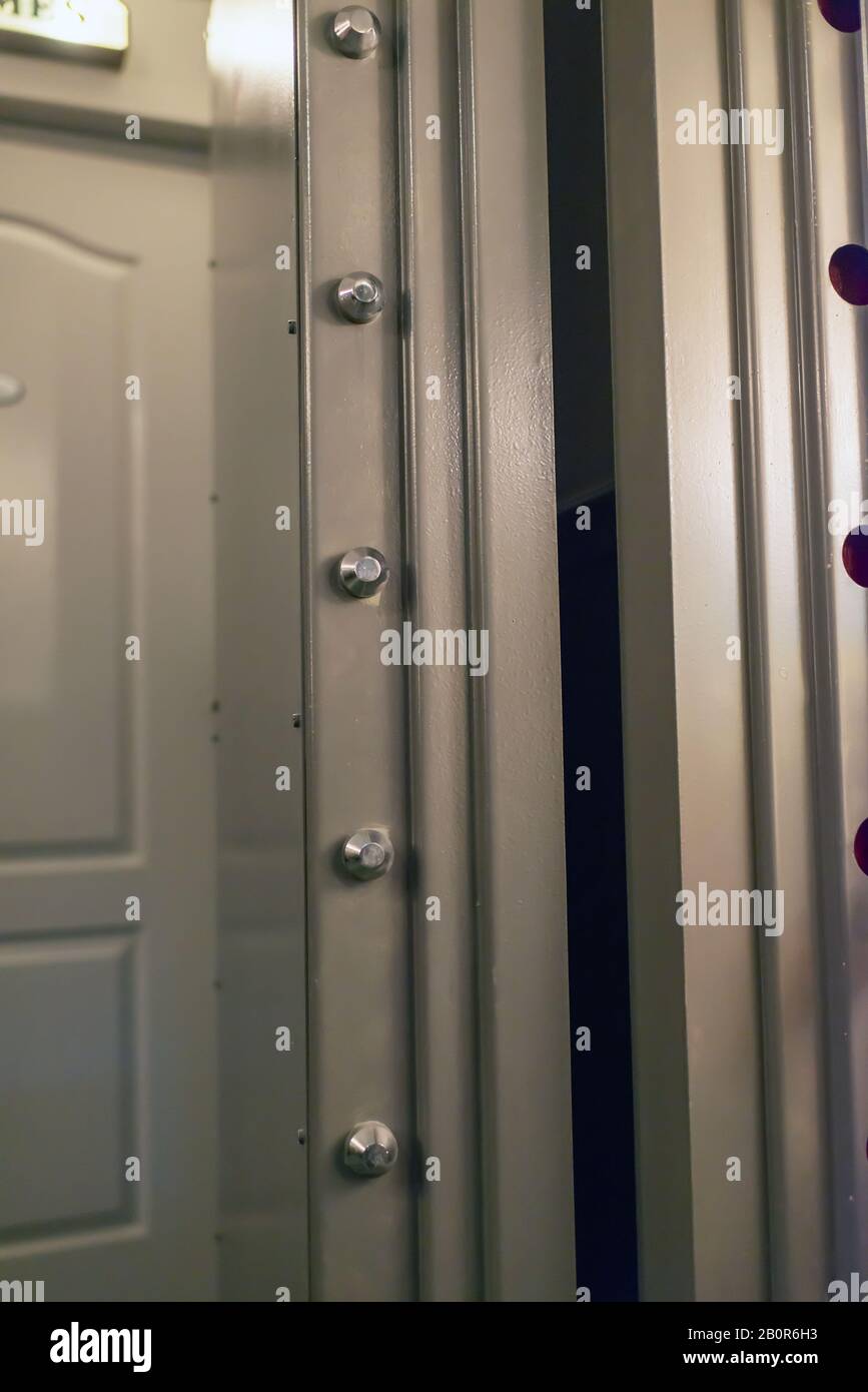 Locking mechanism of solid vault door in a bank Stock Photo - Alamy