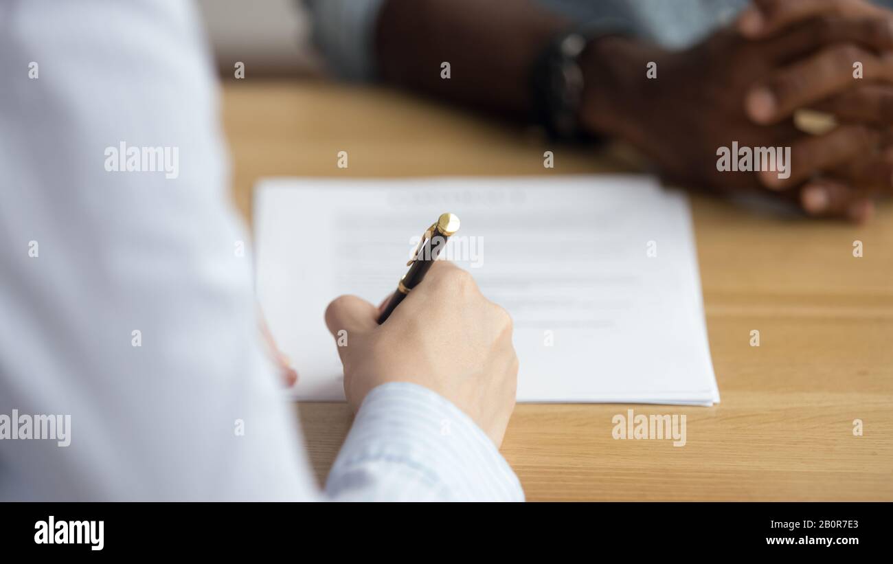 African hand signing legal document hi-res stock photography and images ...