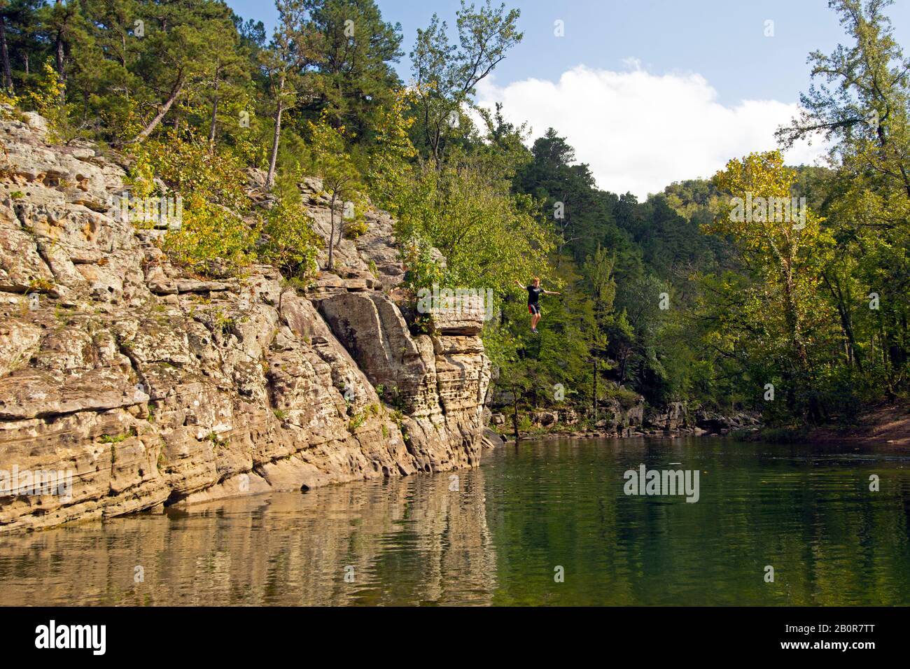 Boy jumps in the Buffalo River at the Ozark National Forest Park ...