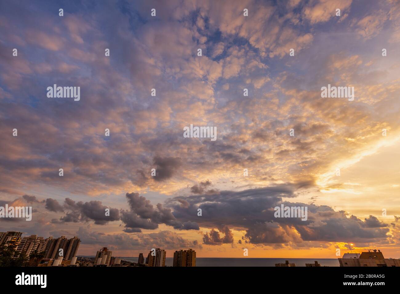 Beautiful sky with clouds at sunset in Haifa, Israel Stock Photo - Alamy