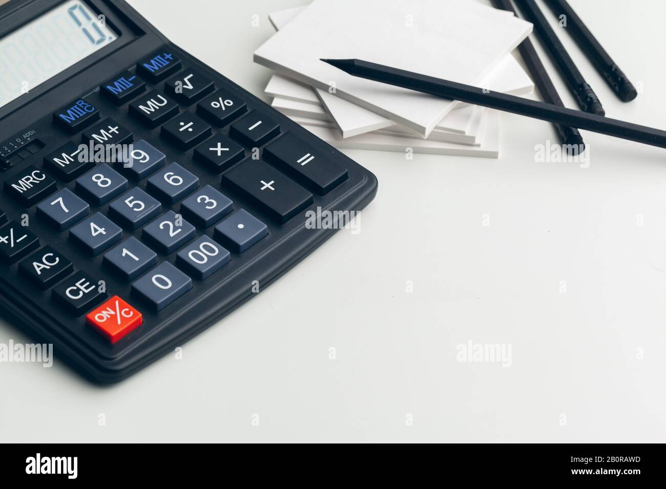 Business still life with calculator on table in office Stock Photo - Alamy