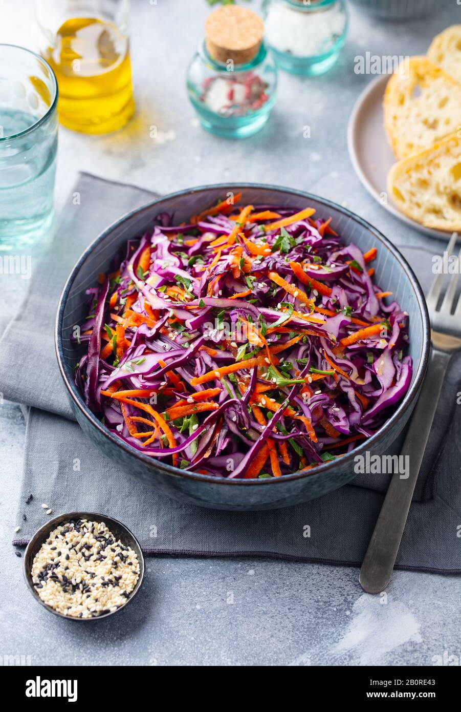 Red cabbage salad, Coleslaw in a bowl. Grey background Stock Photo - Alamy