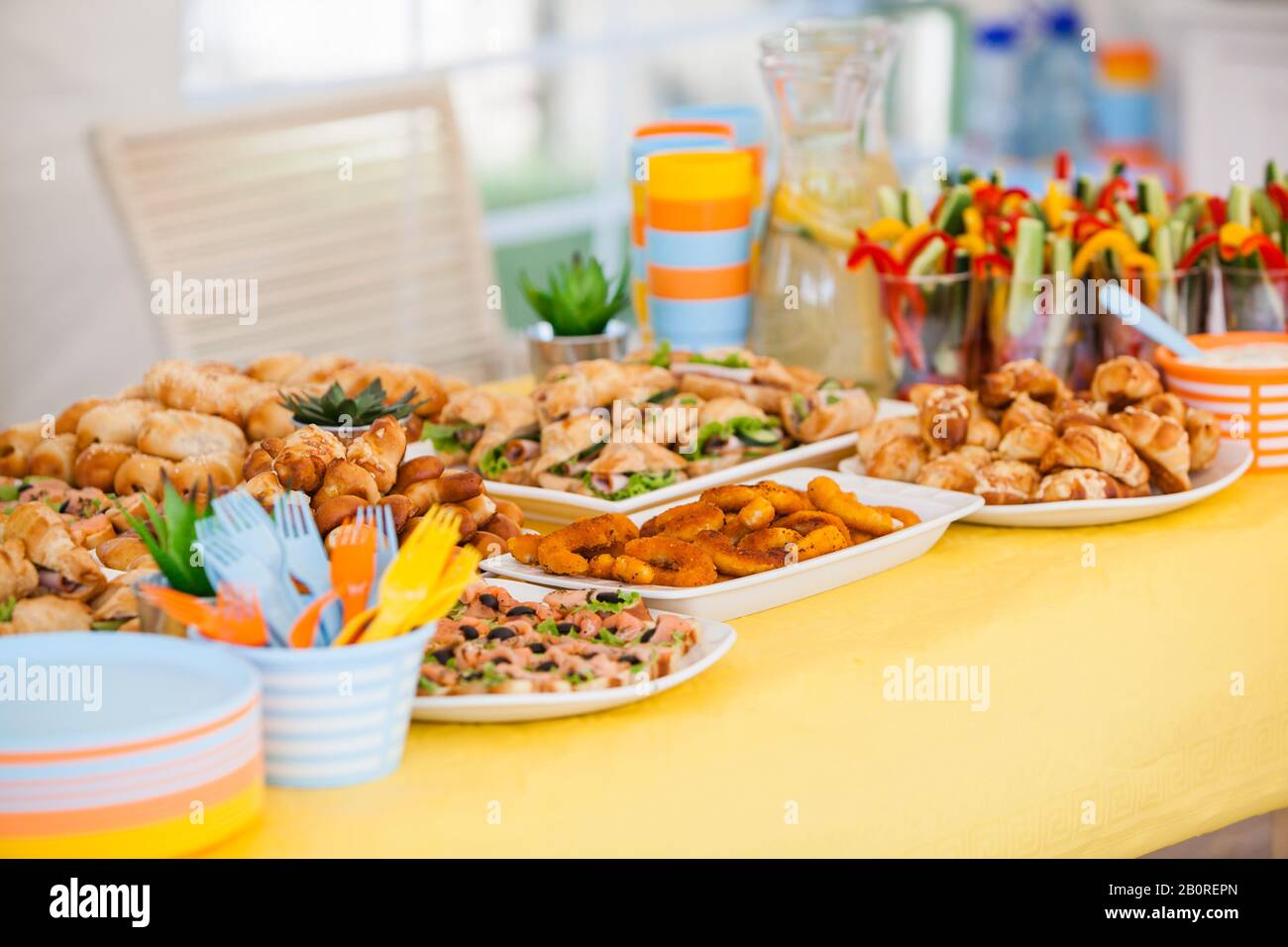 buffet for celebration birthday food on plates, home made sandwiches ...