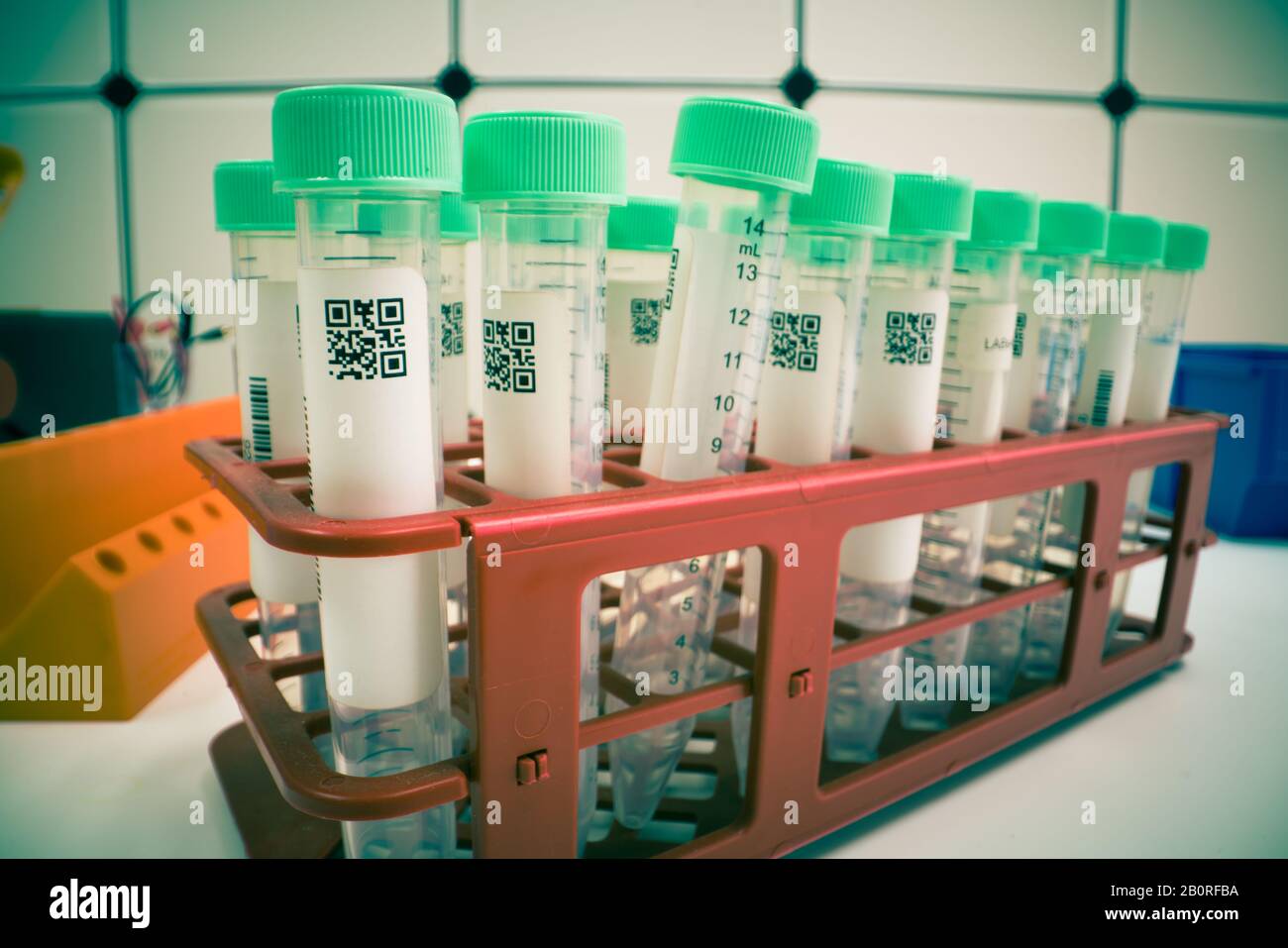Closed test tube with barcode QR biological sample. Toned Image. Test ...