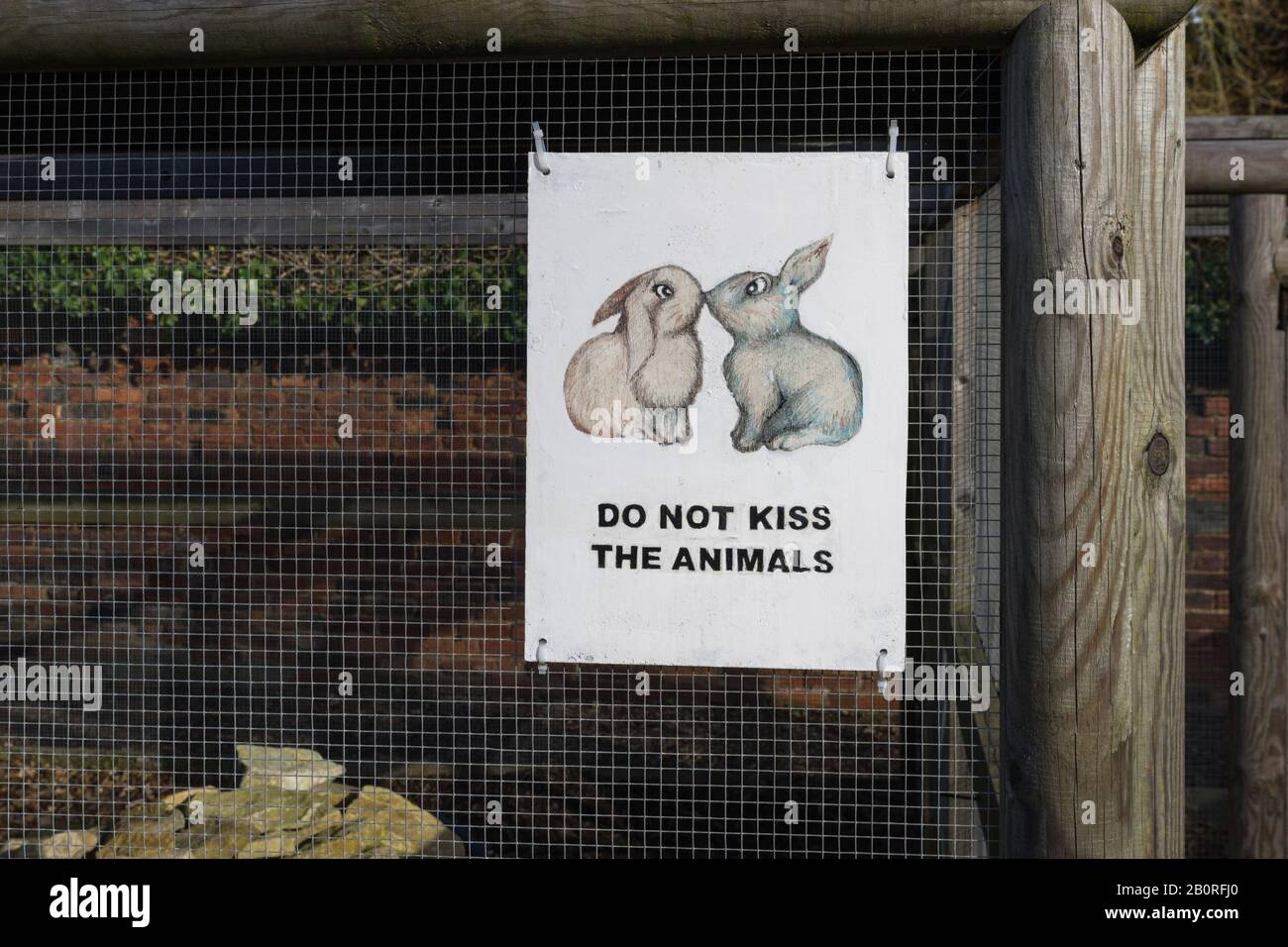 Notice in a small petting zoo asking visitors not to kiss the animals ...