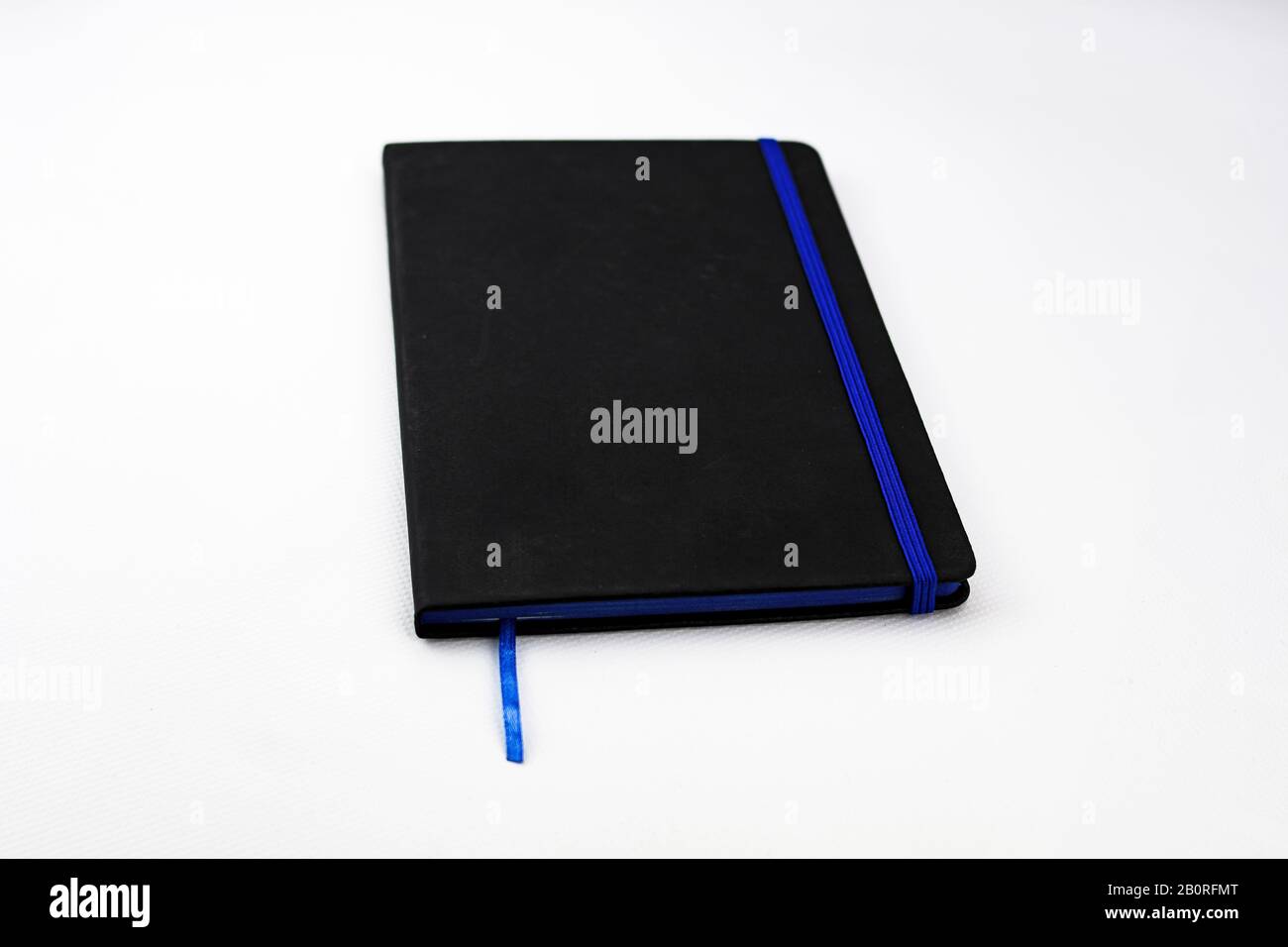 Closed black leather diary with blue trim and separator for mockup as a ...