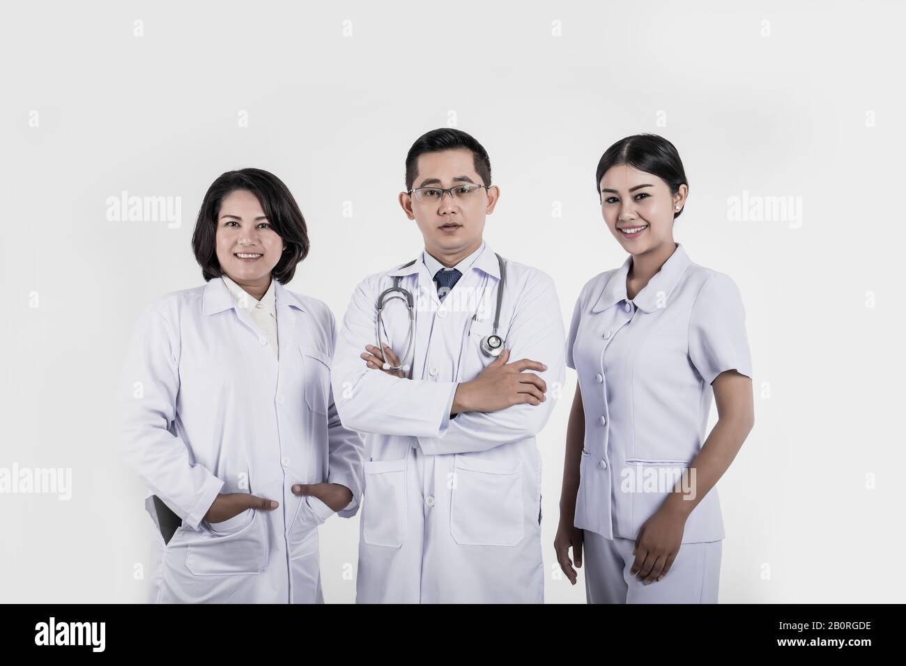 Group of medical staff smiling standing at the hospital Stock Photo - Alamy