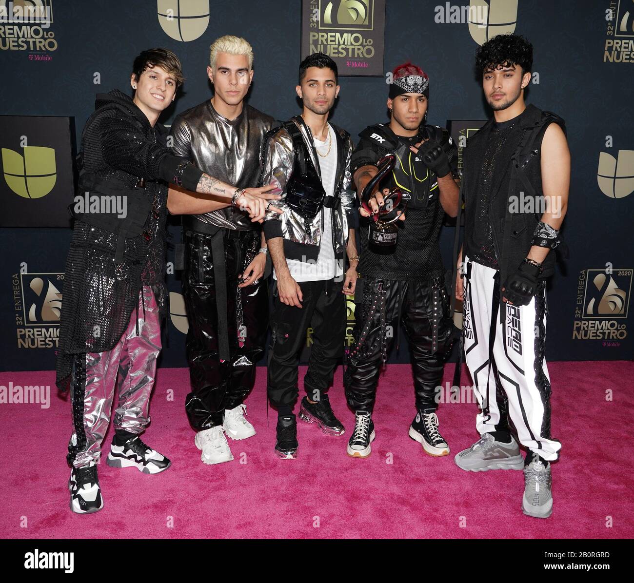 Miami, Florida, USA. 20th Feb 2020. CNCO pose backstage during ...