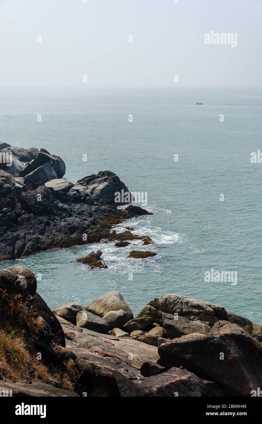 View of the rocky shoreline towards Palolem side as seen from Butterfly ...