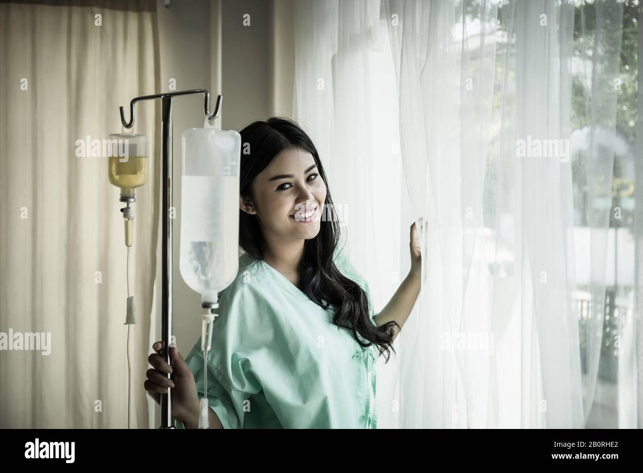 Female patient standing in the room in hospital. Hope concept Stock ...