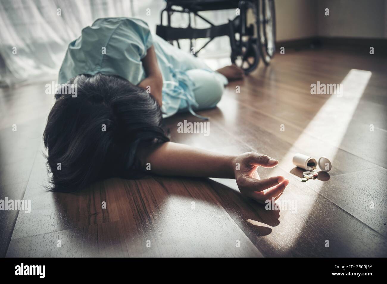 Female patients fall unconscious from a wheelchair on the floor. Heart ...