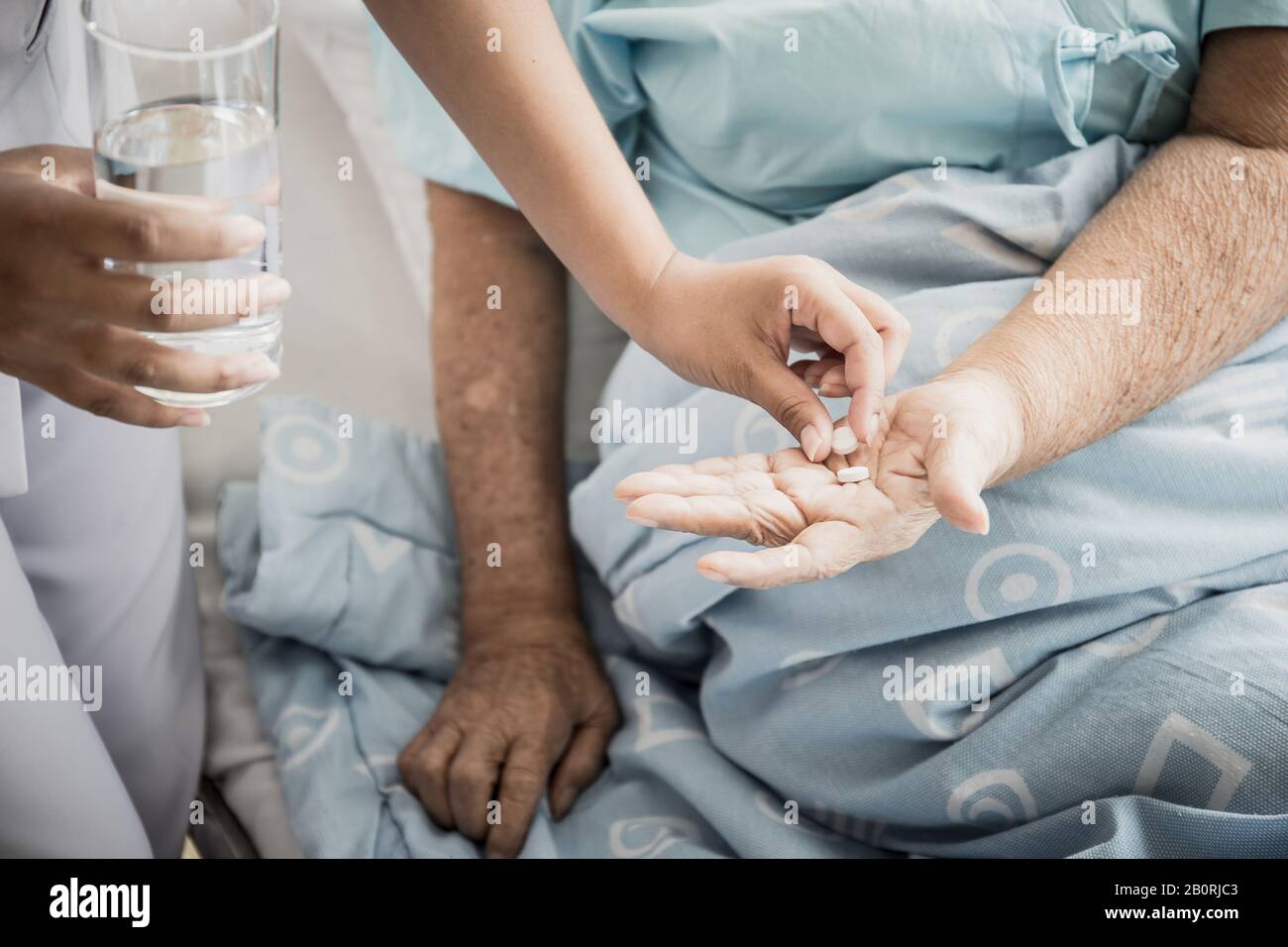 Doctor nurse giving assistance hi-res stock photography and images - Alamy