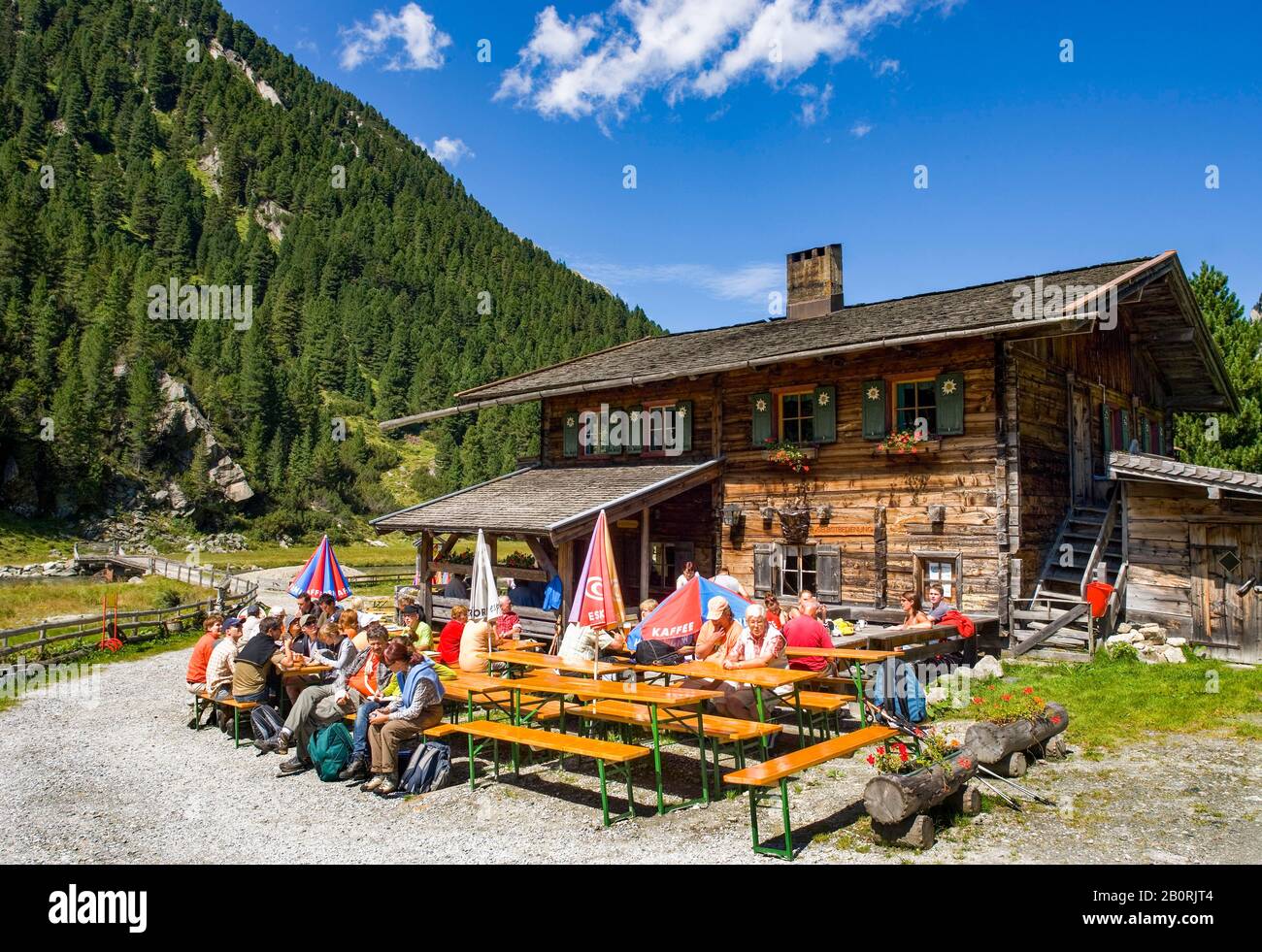 Managed alpine hut with hiker hi-res stock photography and images - Alamy