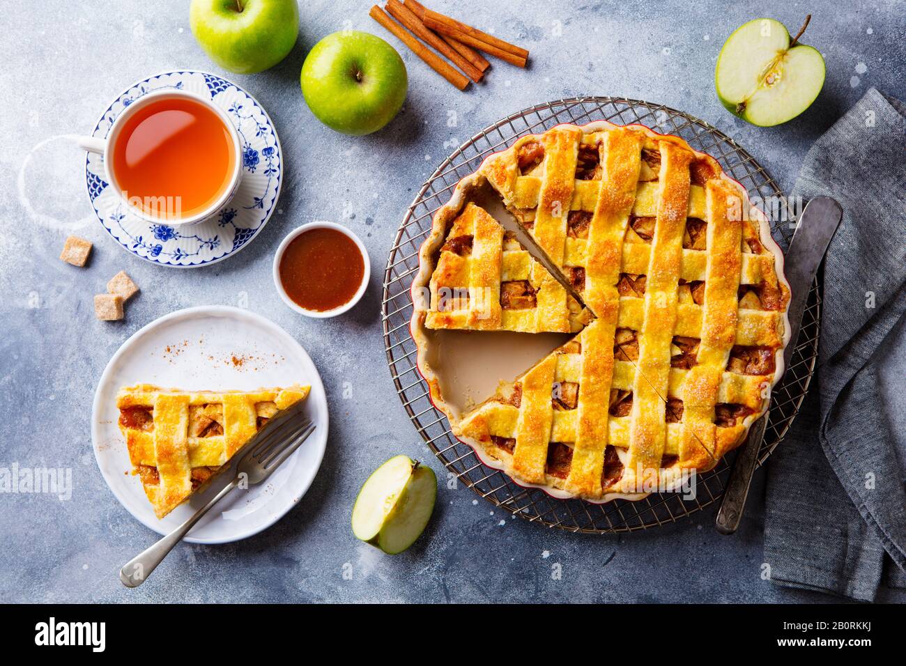Apple pie on a cooling rack. Grey background. Copy space. Top view ...
