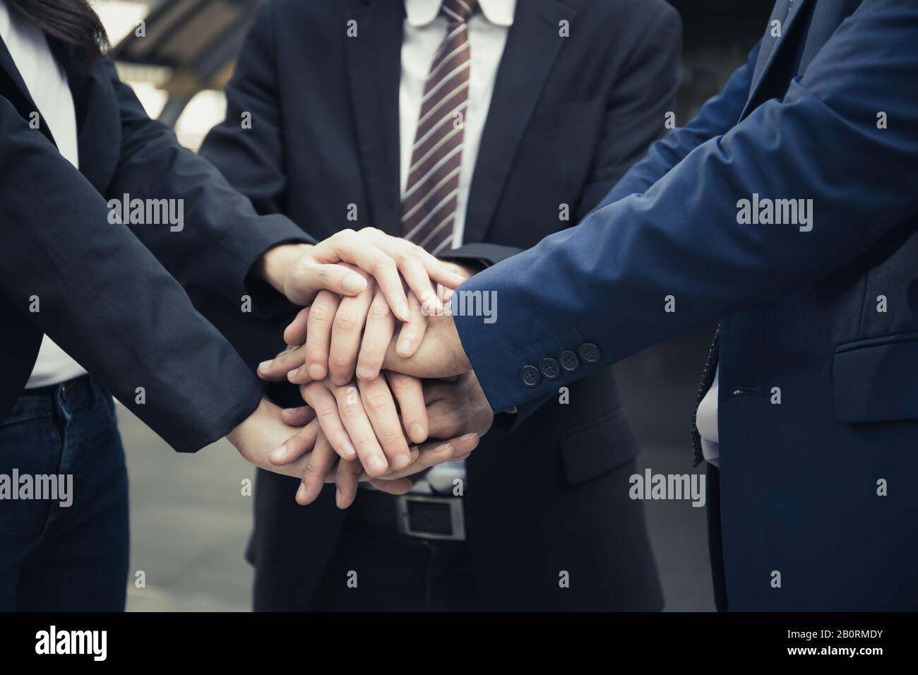 Group of Business Partners Team with hands together. People with ...