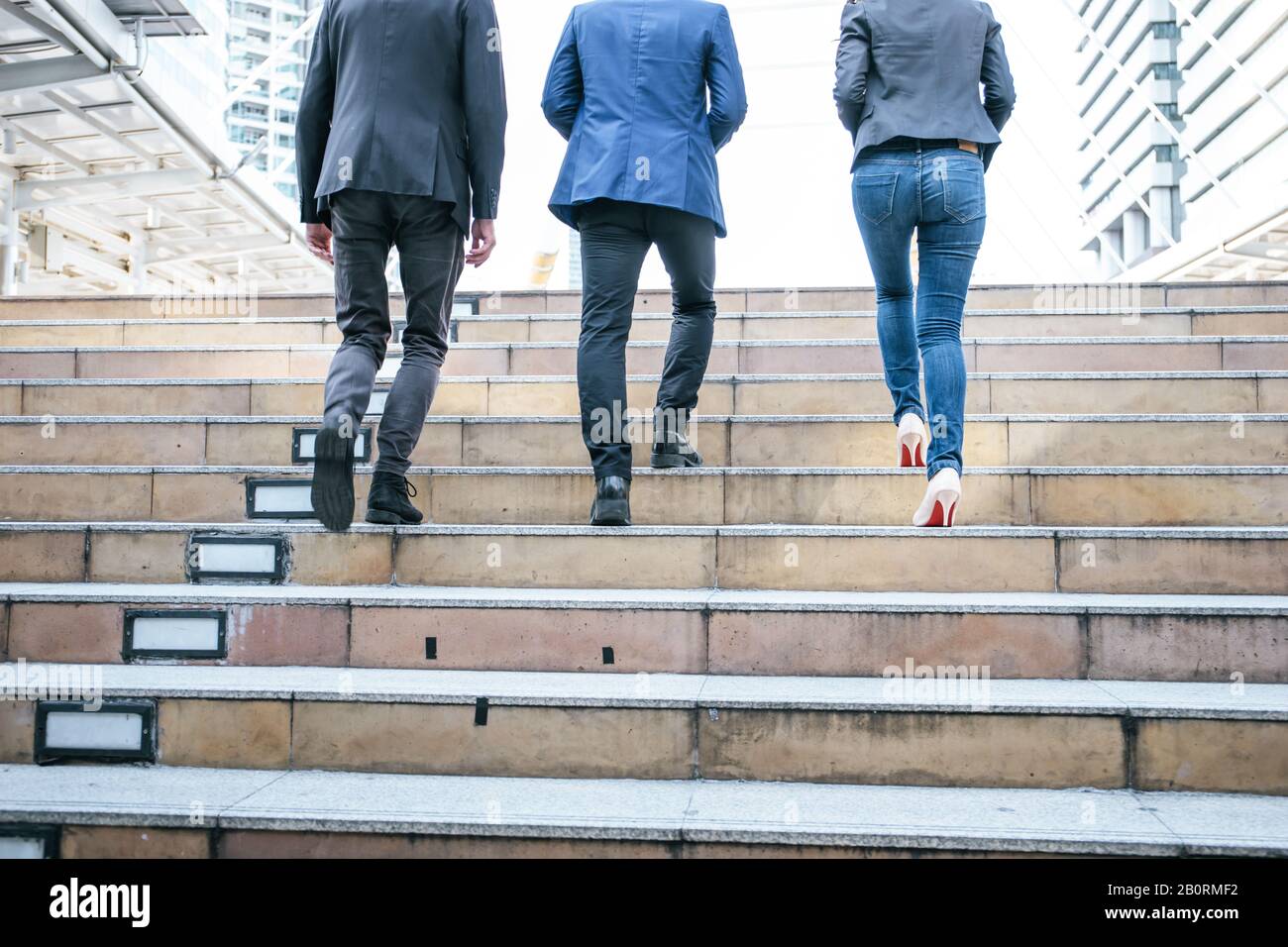 Group of Business people Walking up the stairs the way to go work Stock ...