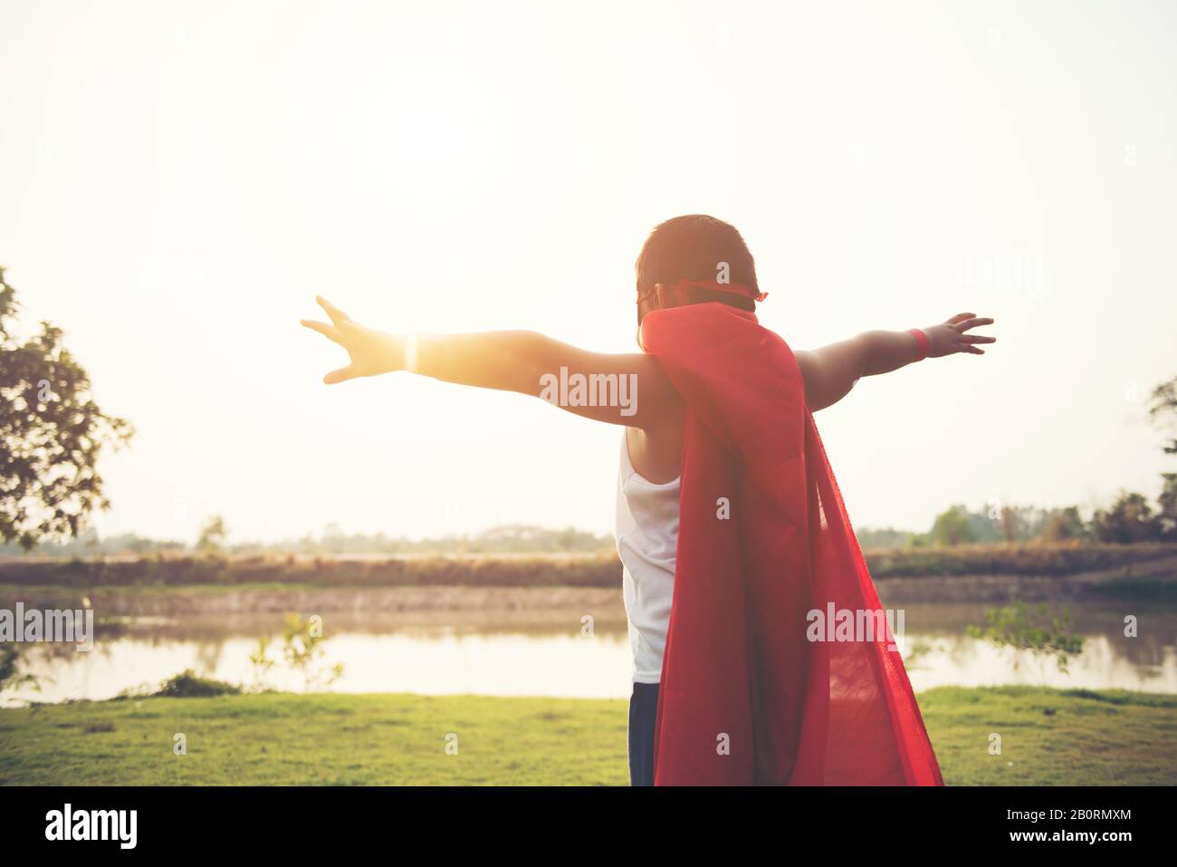 Super kids standing hi-res stock photography and images - Alamy