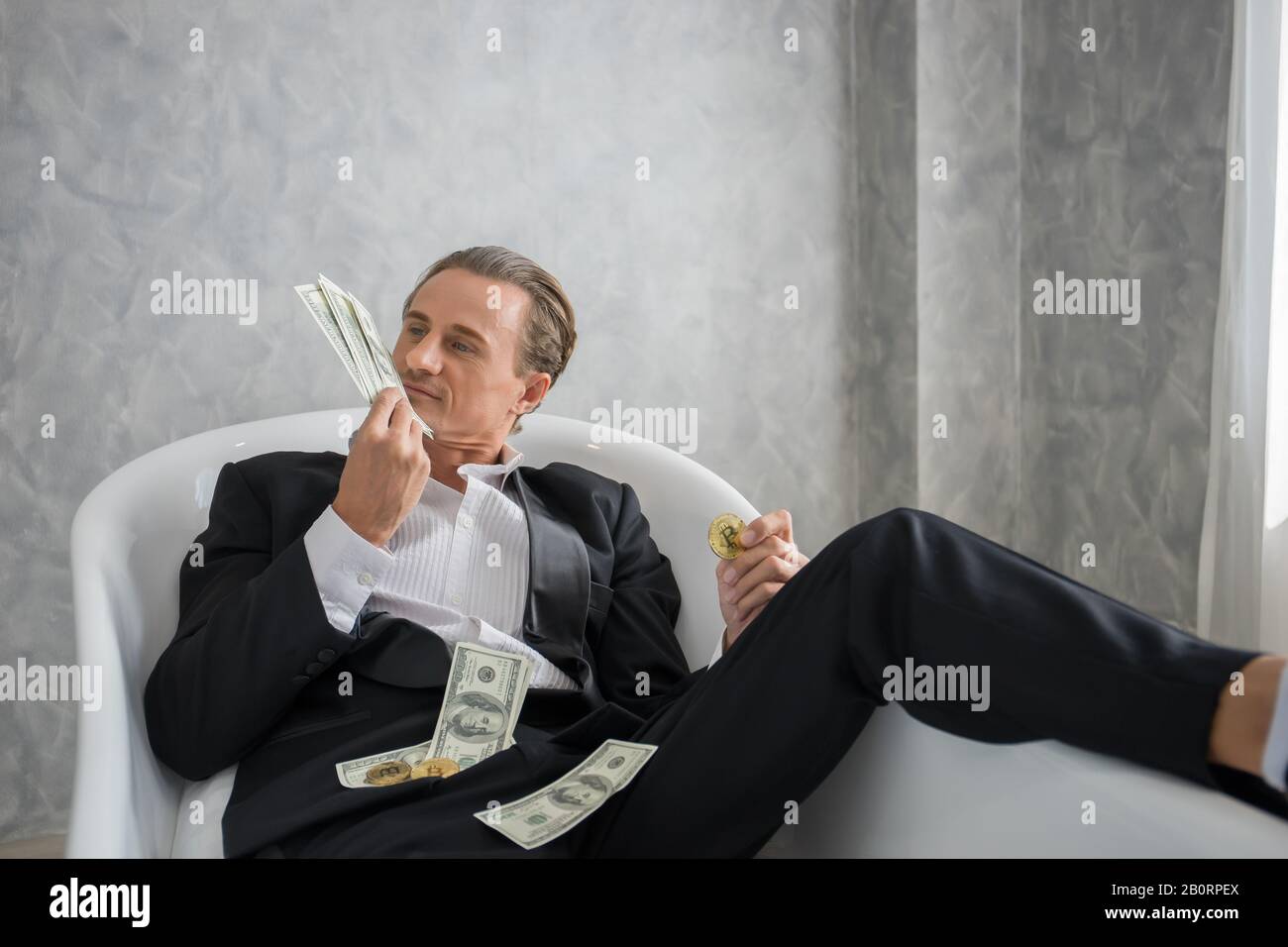 Bathing money man hi-res stock photography and images - Alamy