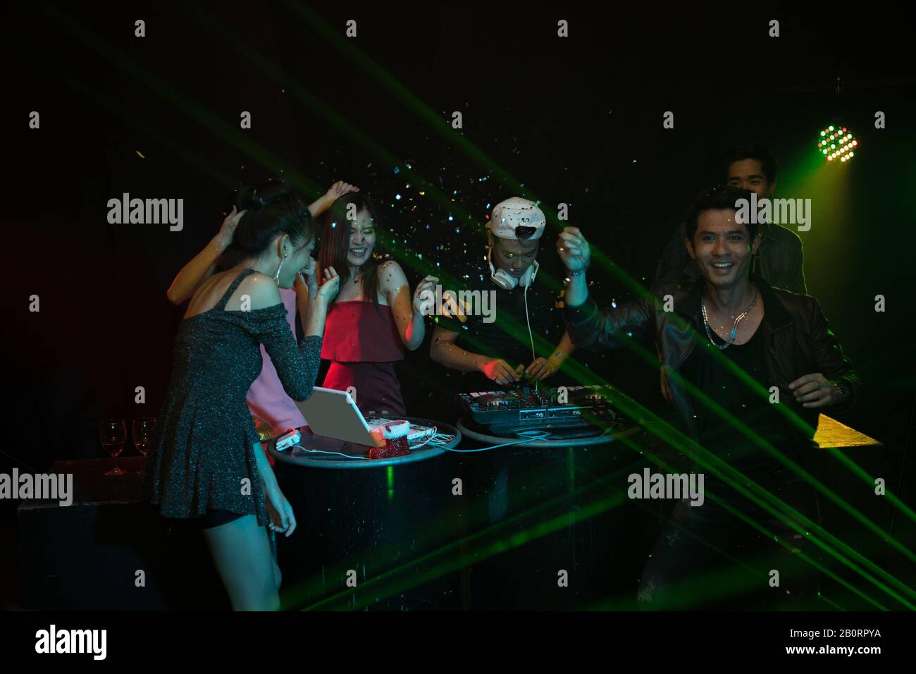 Party young people group dancing in night club Stock Photo - Alamy