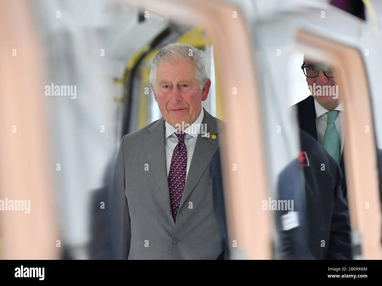 The Prince of Wales onboard a train being constructed during a visit to ...