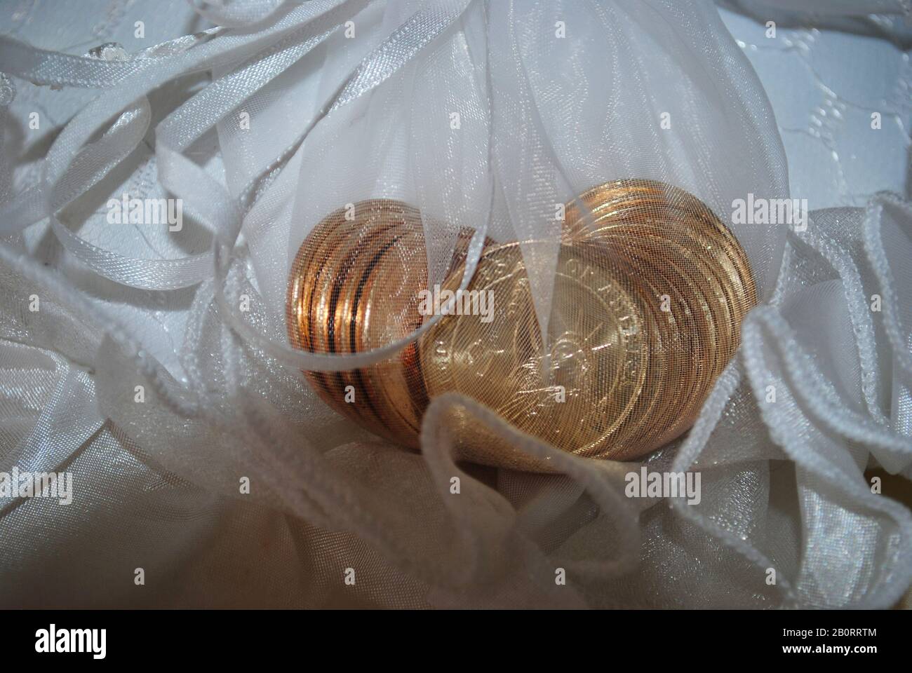Gold coins called ahras or arrhae used as wedding accessories during ...