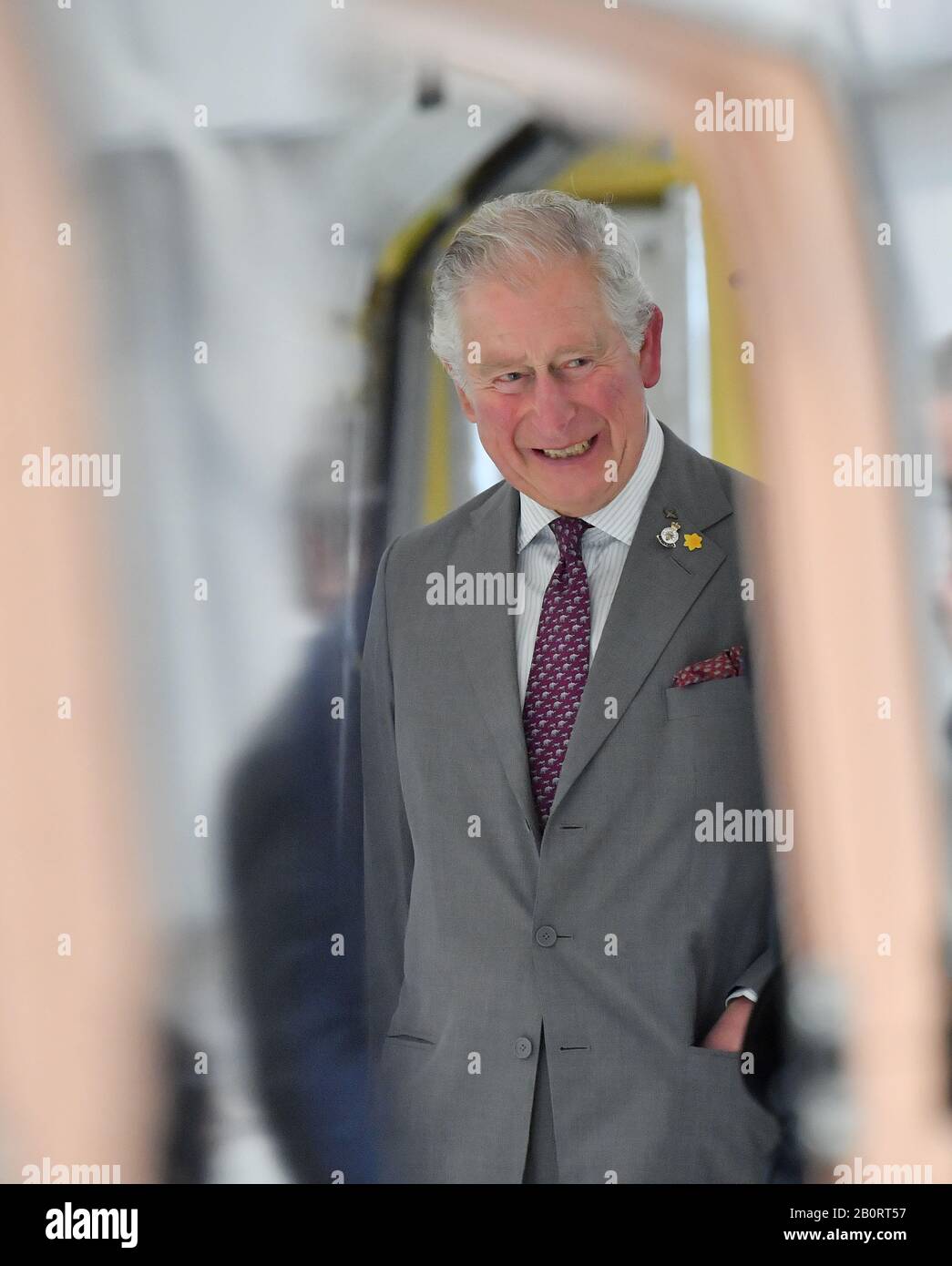 The Prince of Wales onboard a train being constructed during a visit to ...