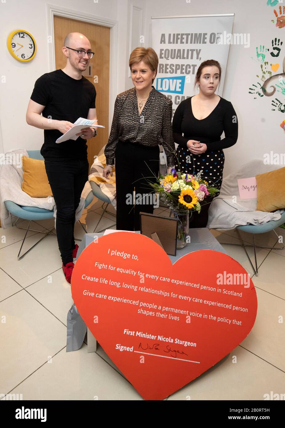 First Minister Nicola Sturgeon (centre), with chair Ryan McCuaig (left ...