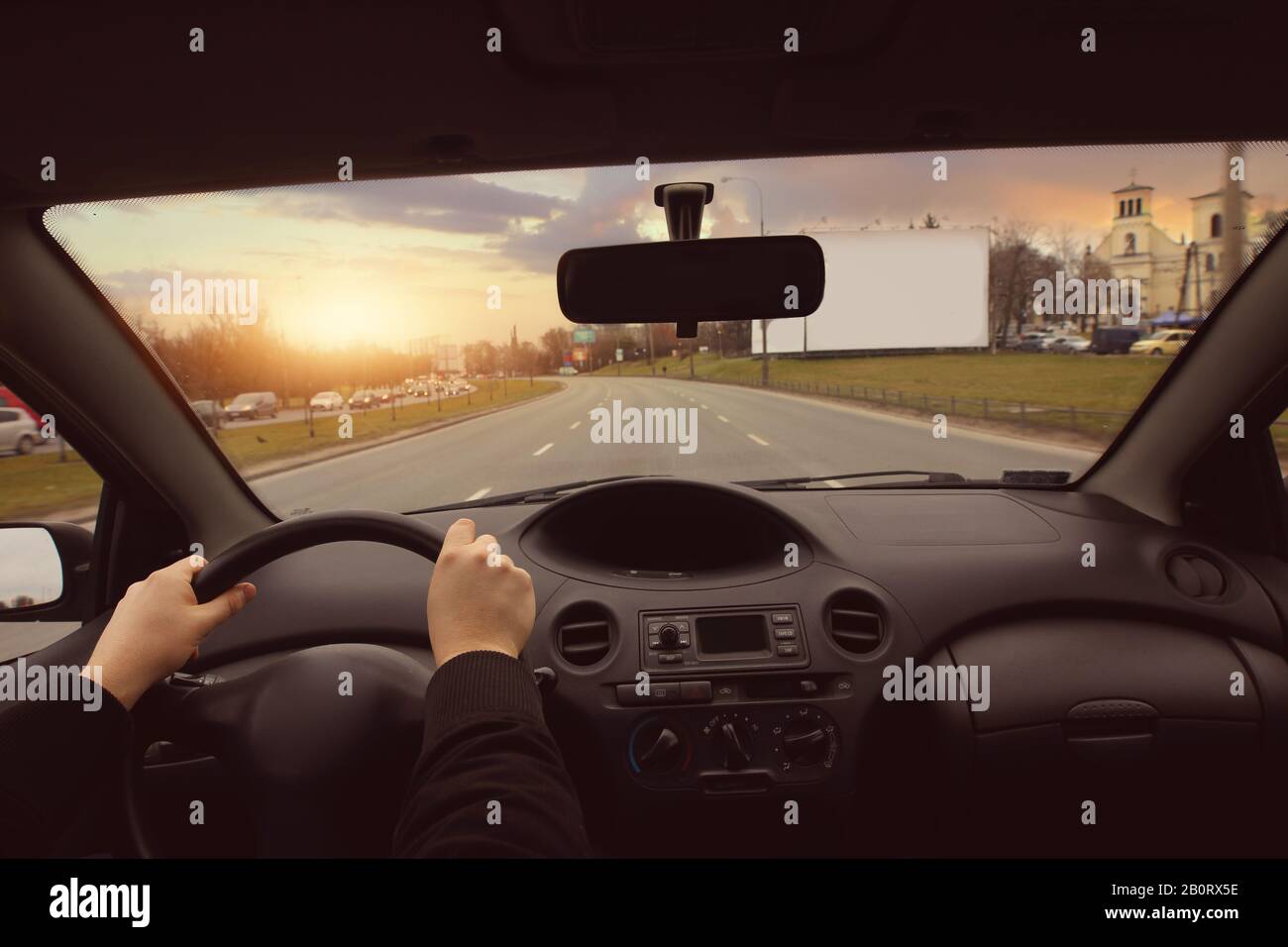 slow car driving in the city center Stock Photo - Alamy