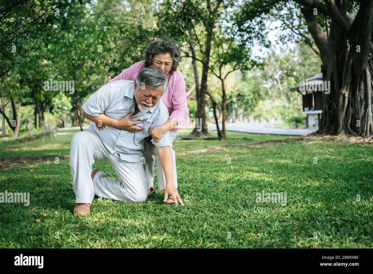 Old man having a chest pain Stock Photo - Alamy