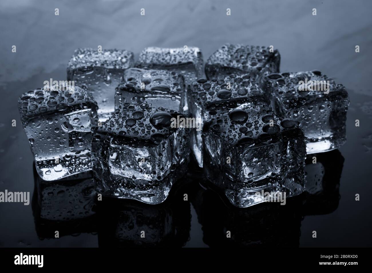 Ice cubes with water drop Stock Photo - Alamy