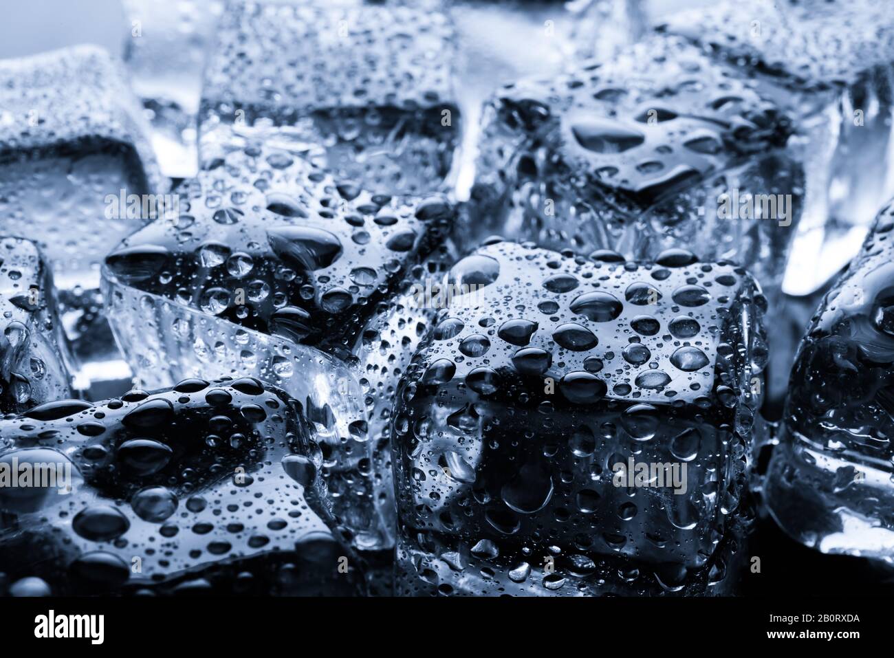 Ice cubes with water drop Stock Photo - Alamy