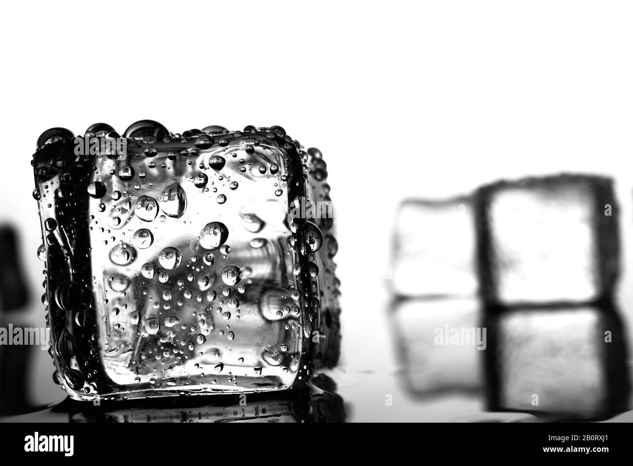 Ice cubes with water drop Stock Photo - Alamy