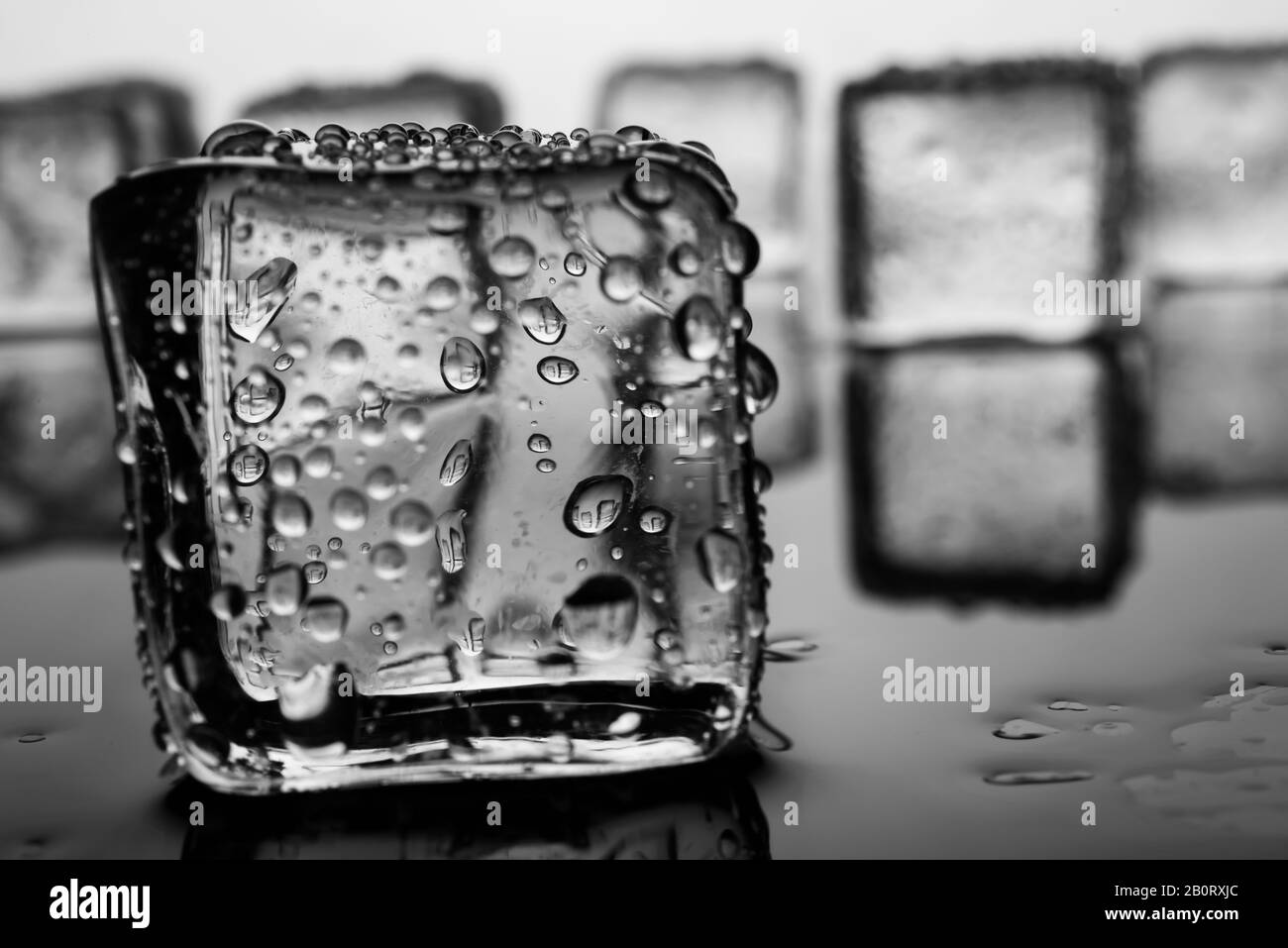 Ice cubes with water drop Stock Photo - Alamy