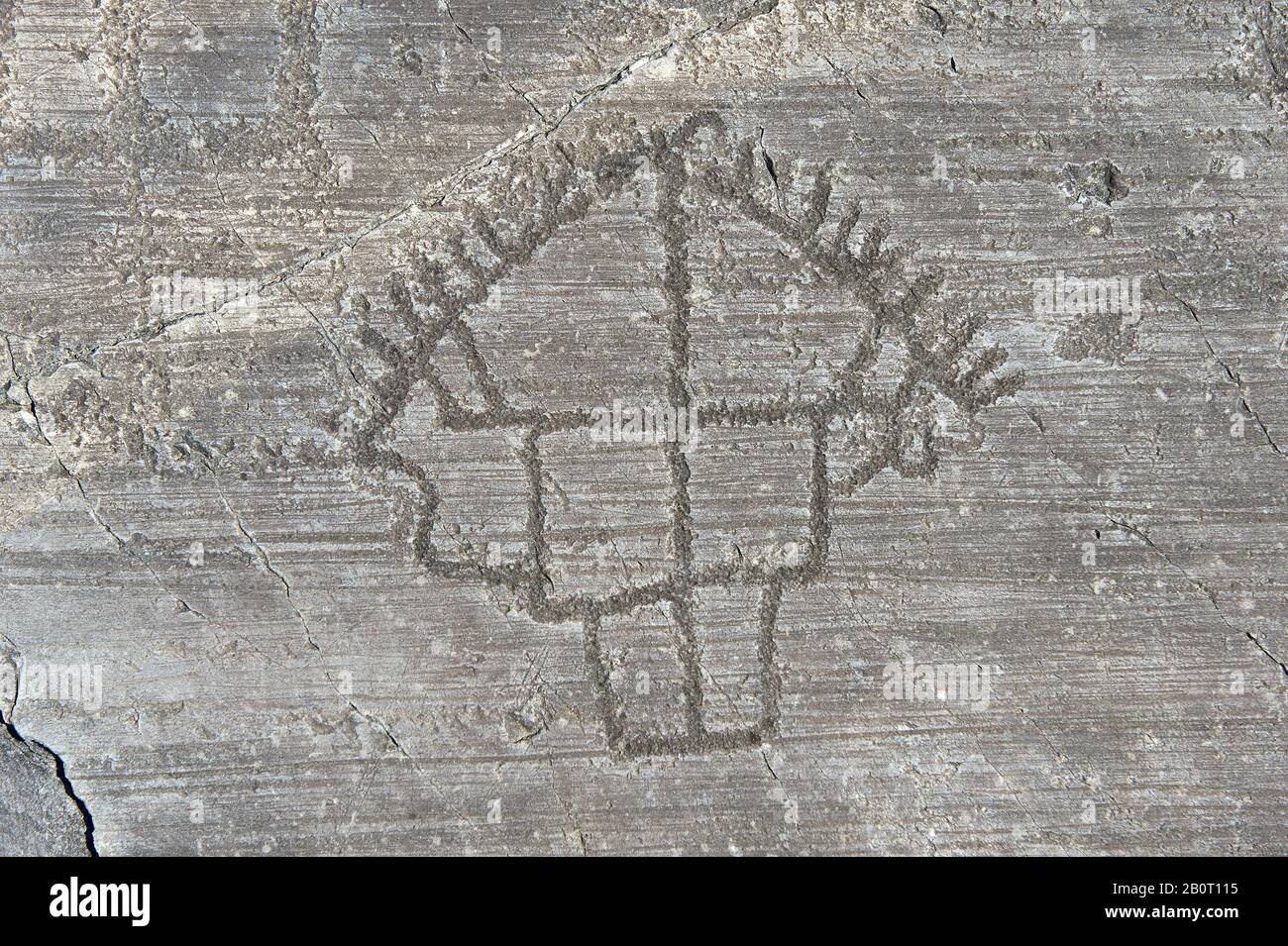Petroglyph, rock carving, depicting houses built on poles . Carved by ...