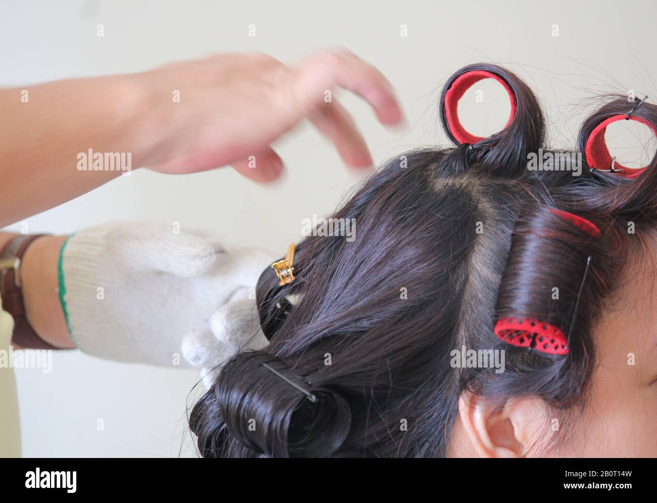 Hair of a bride in rollers during the wedding preparation Stock Photo ...