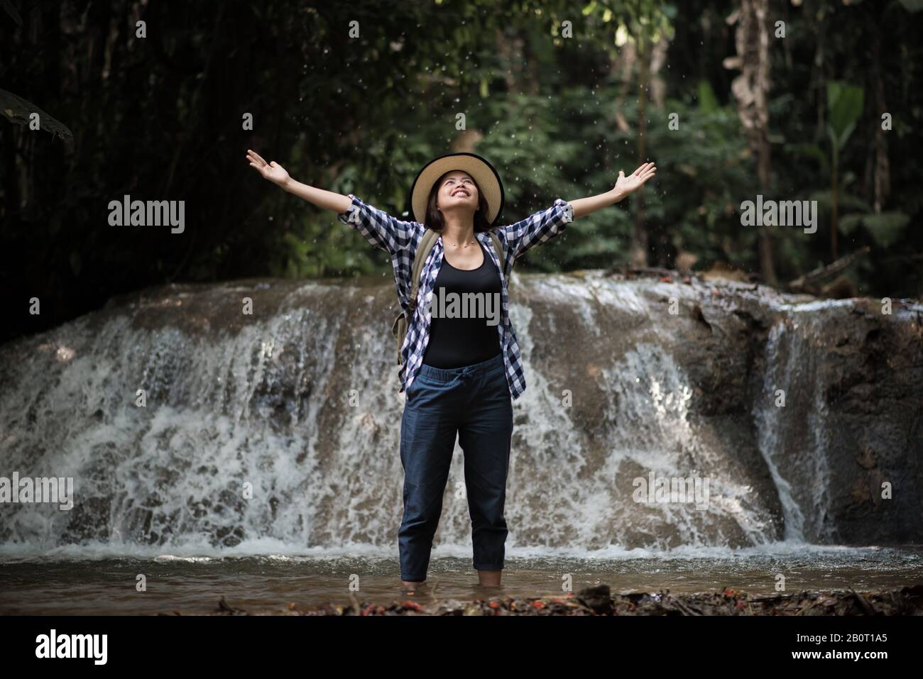 People Swimming Under Waterfall High Resolution Stock Photography and ...