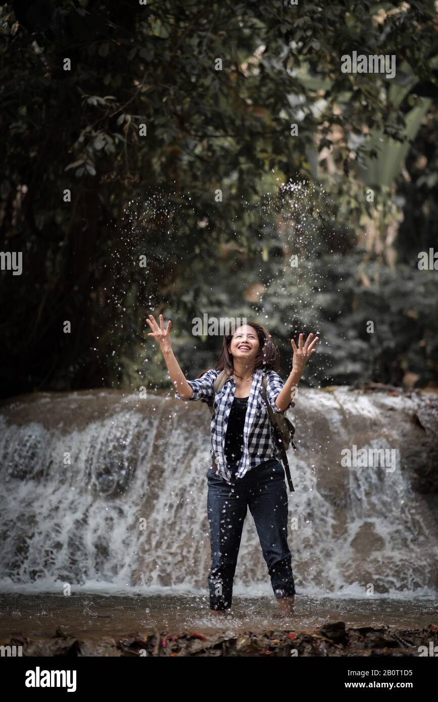 People Swimming Under Waterfall High Resolution Stock Photography and ...