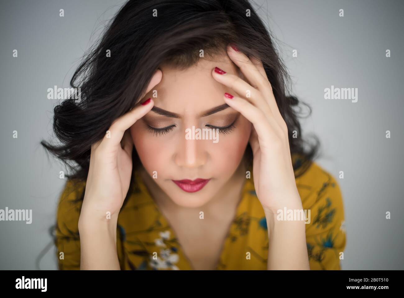 Woman face showing head pain hi-res stock photography and images - Alamy