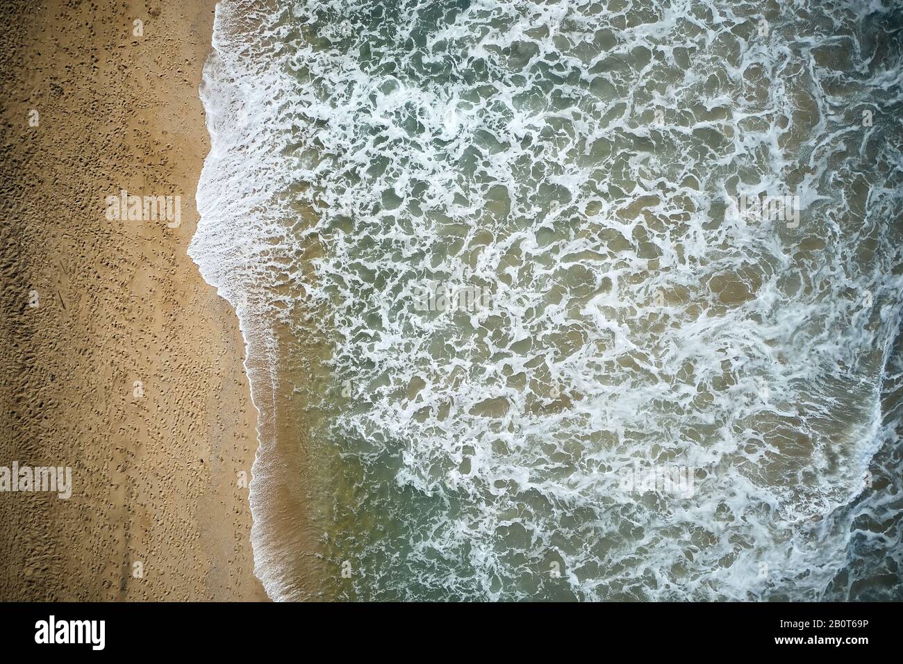 Aerial View of Waves and Azure beach with rocks. Kerala, India Stock ...