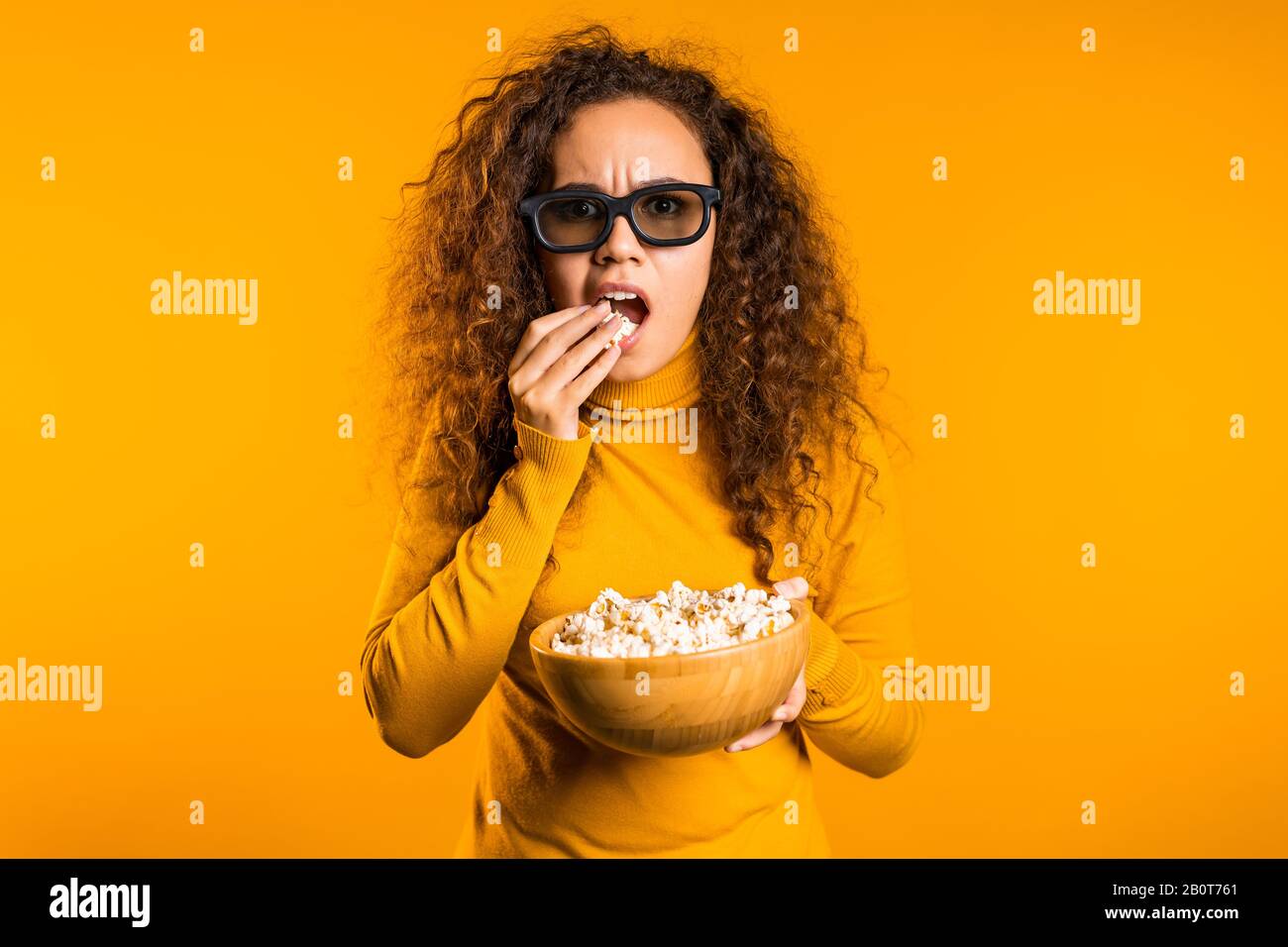 Woman watching film cinema box hi-res stock photography and images - Alamy