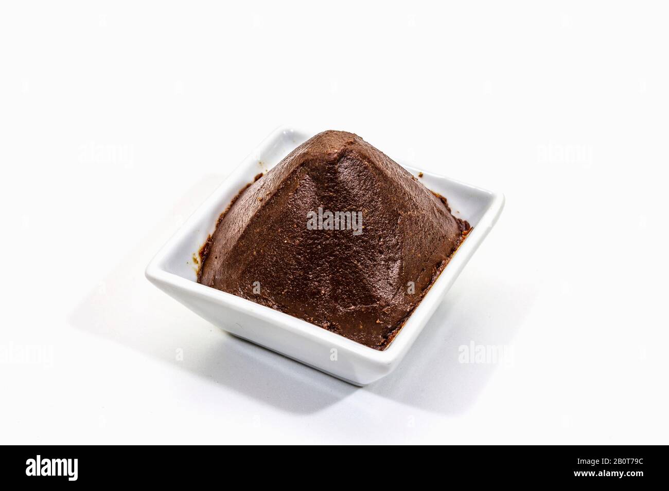 Dark brown miso paste isolated on white background. Traditional ...