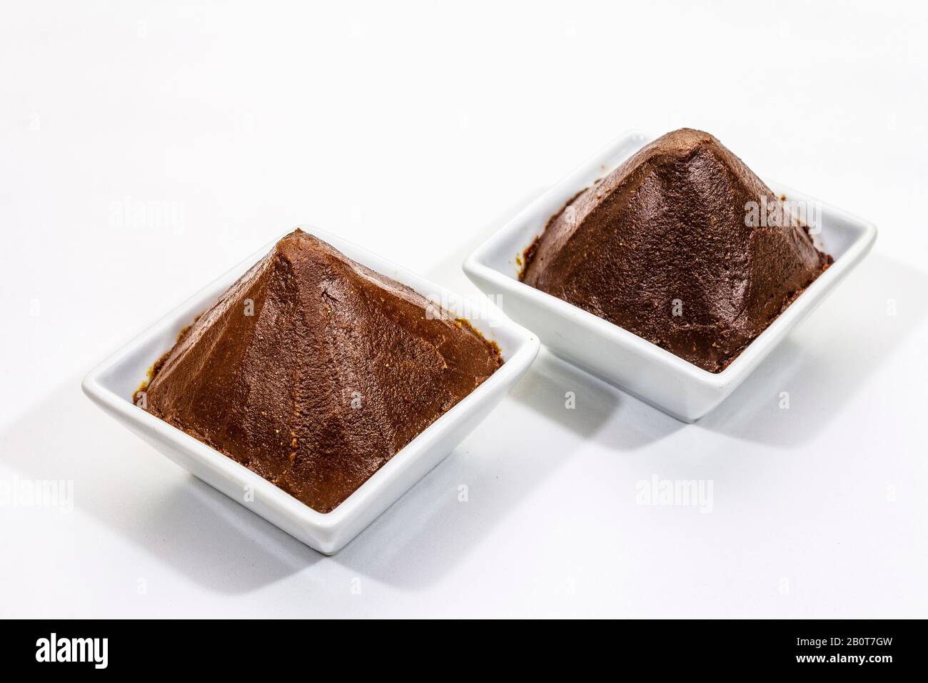 Miso, traditional Japanese seasoning. Two types, dark and light brown ...