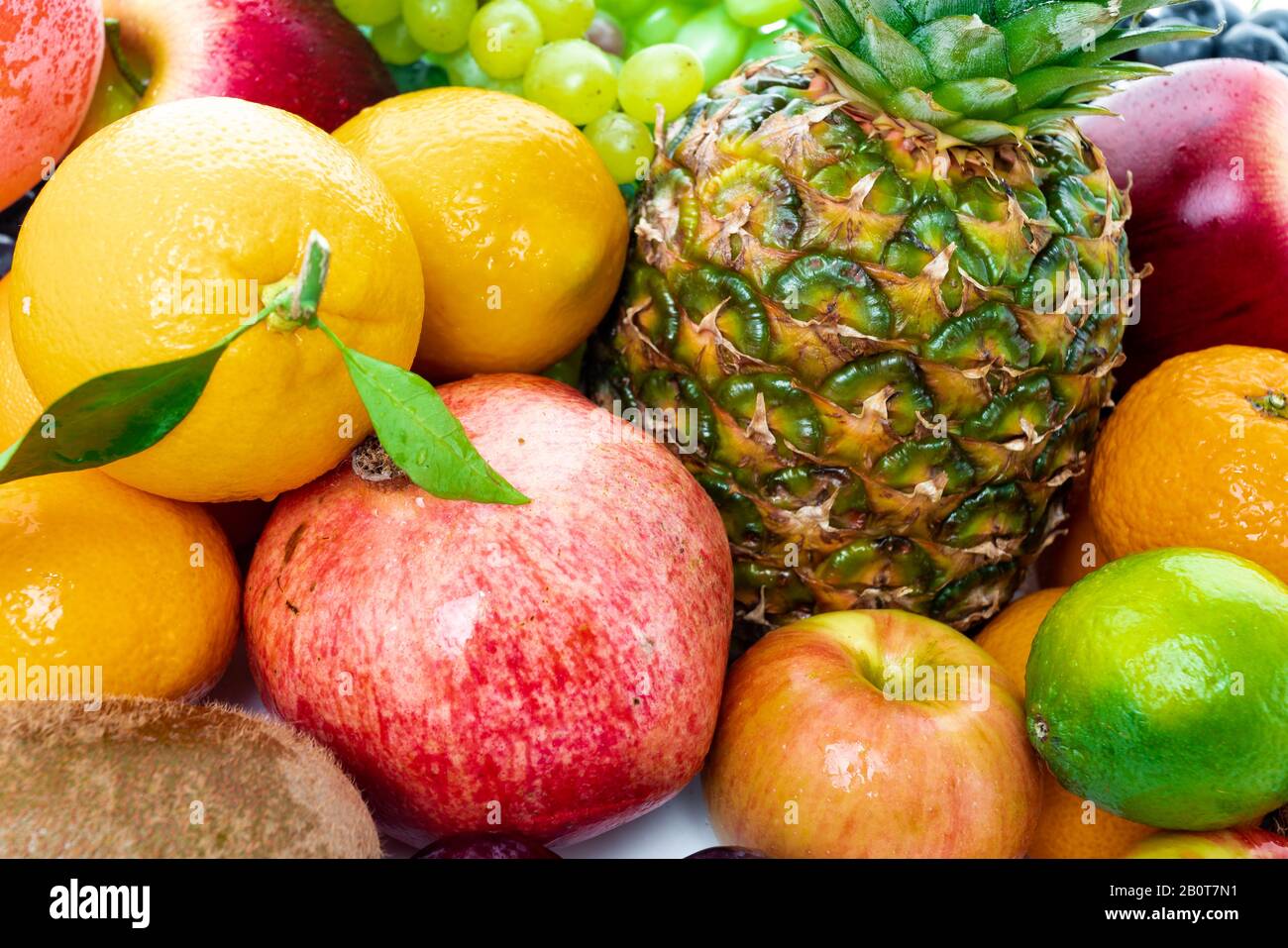 Organic food background. different fruits Stock Photo - Alamy