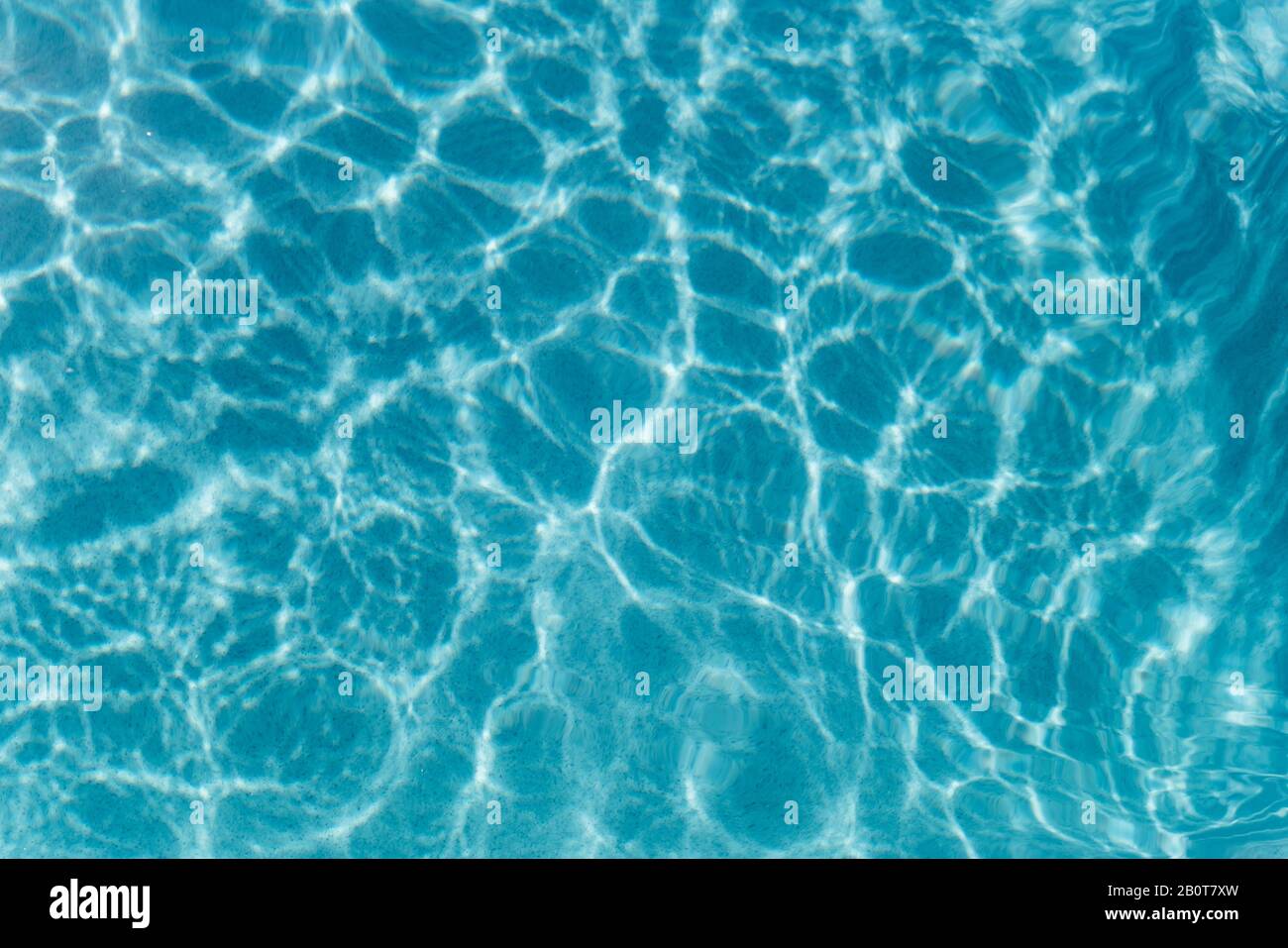 Beautiful refreshing blue swimming pool water. Background of blue water ...