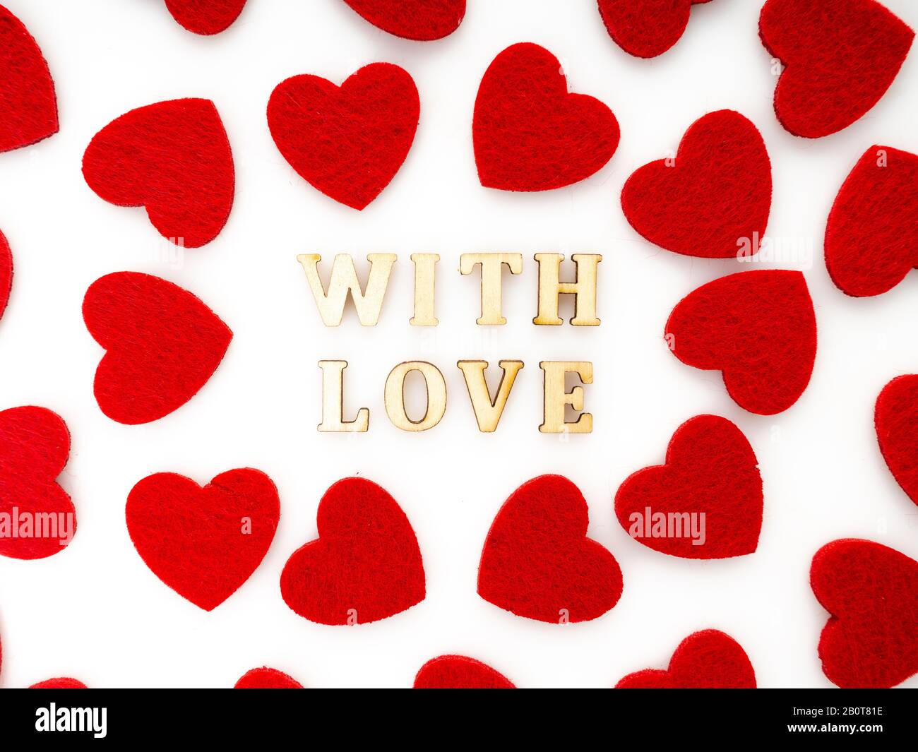 Lettering LOVE with red heart on white Stock Photo - Alamy