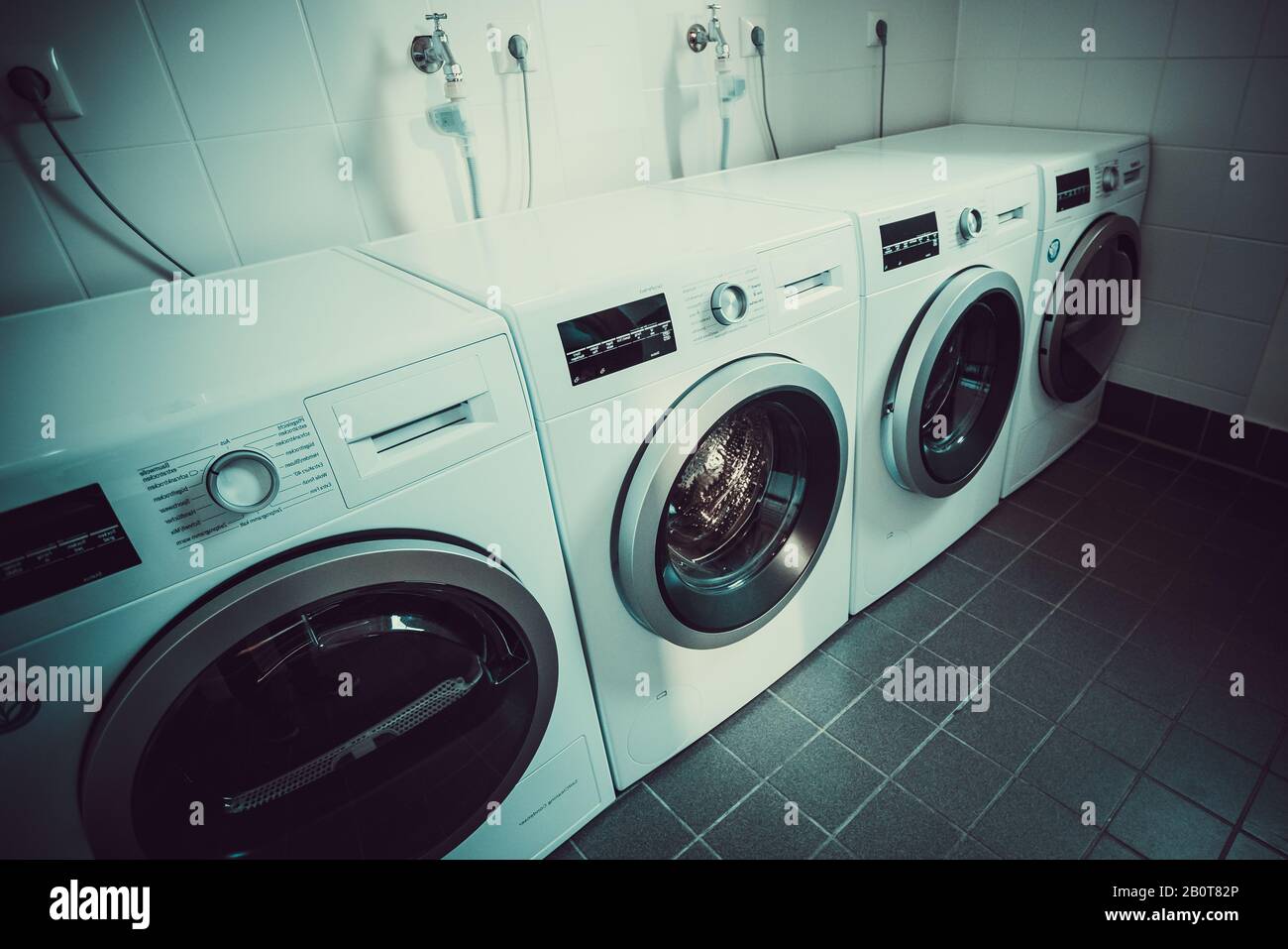 Modern launderette hi-res stock photography and images - Alamy