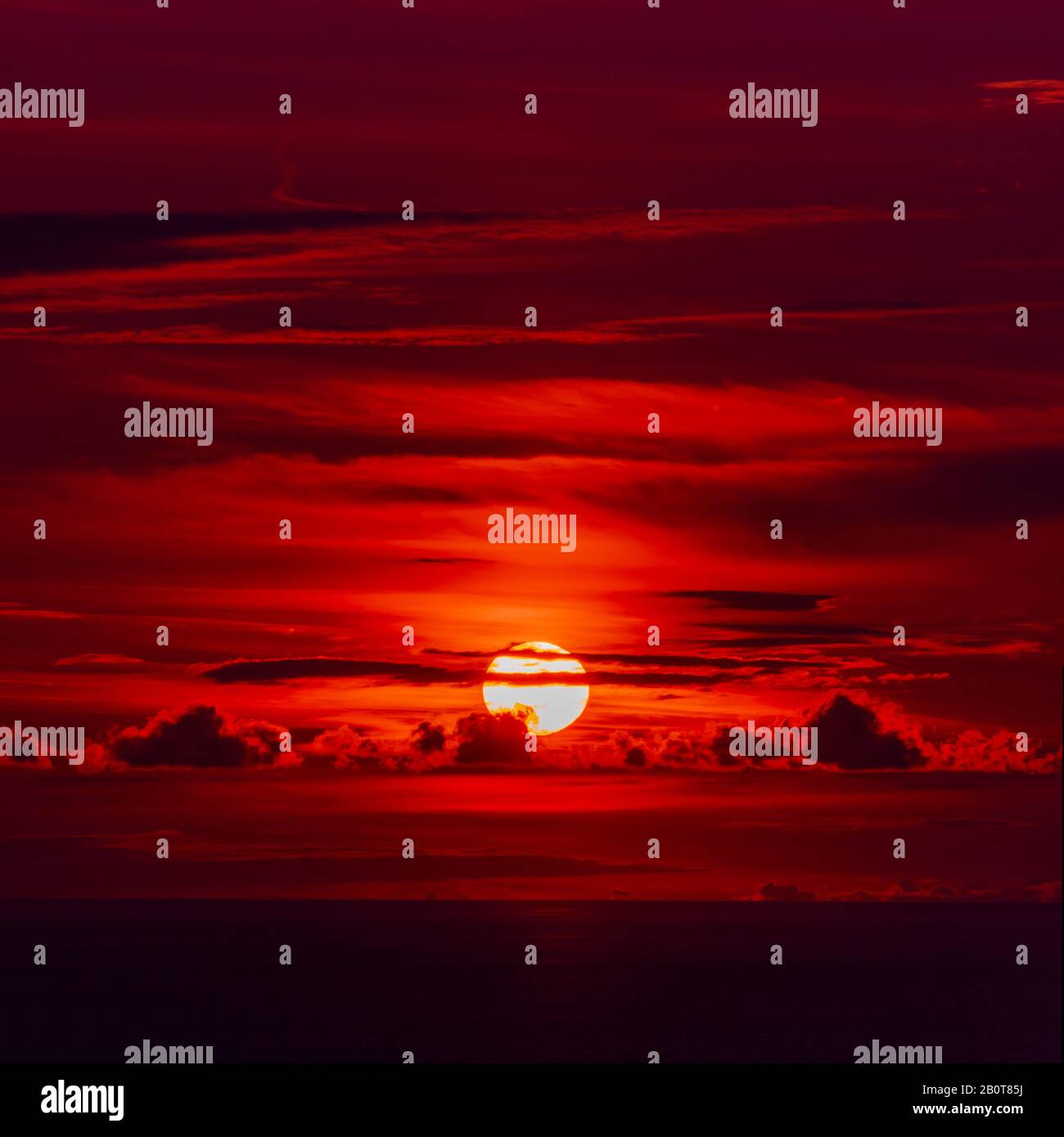 Beautiful sky. red sunlight lighting the clouds softly Stock Photo - Alamy