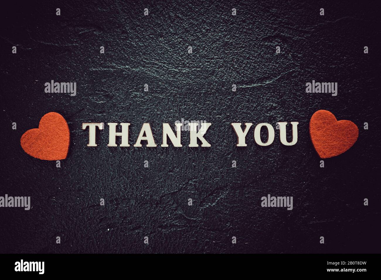 Thank you text on black background Stock Photo - Alamy