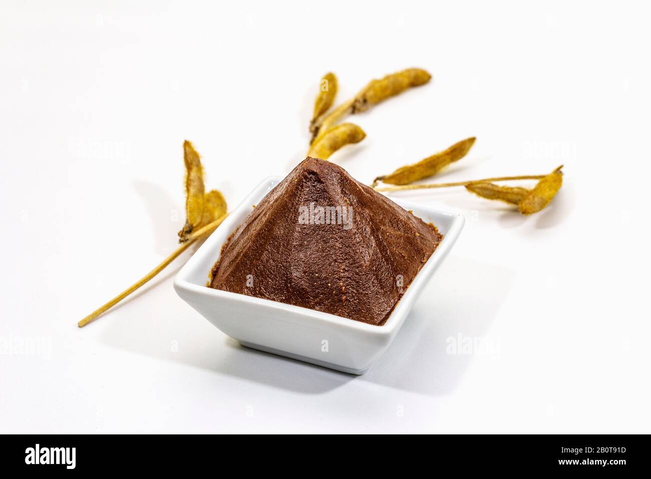 Light brown miso paste isolated on white background. Traditional ...