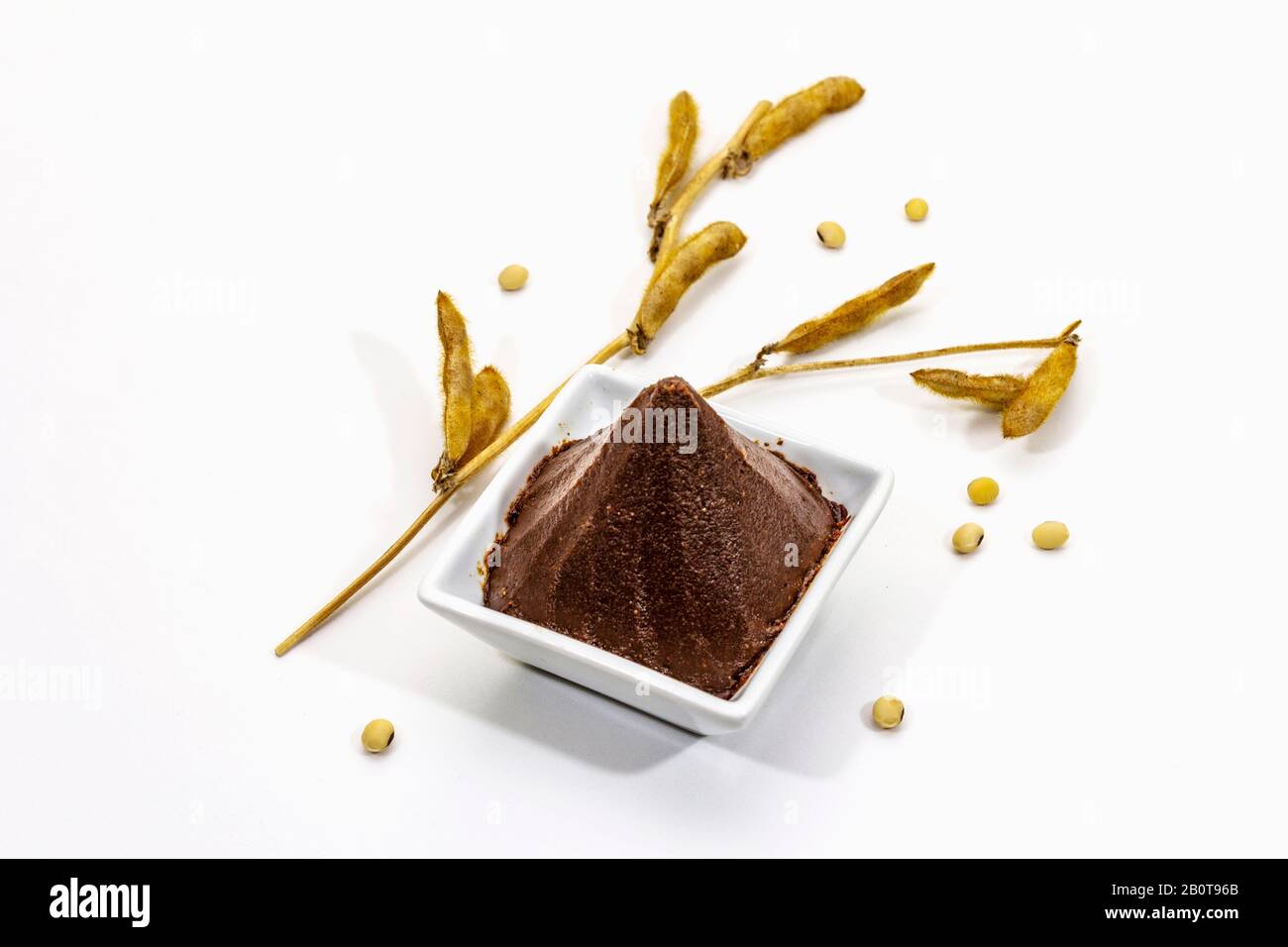 Dark brown miso paste isolated on white background. Traditional ...